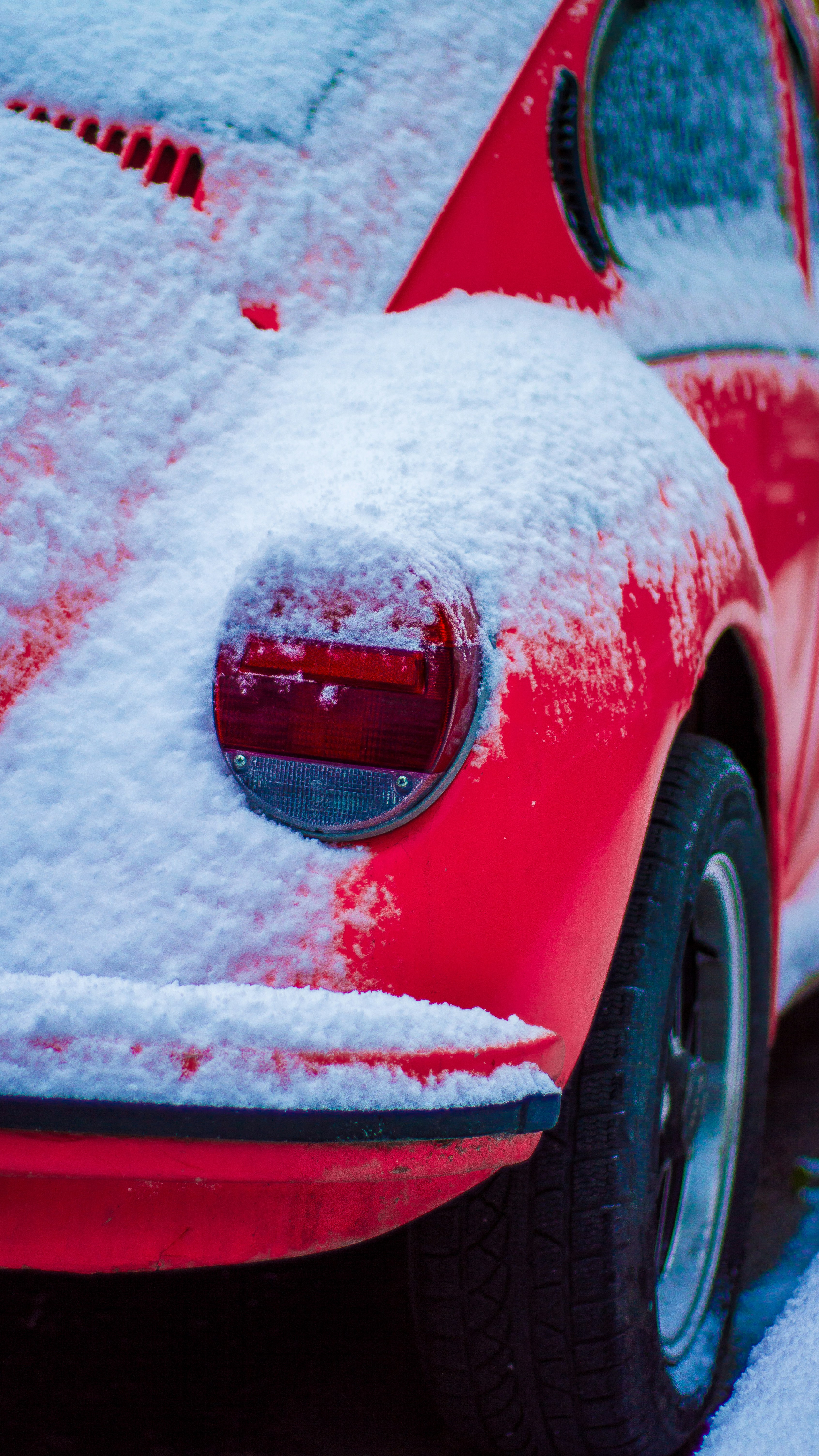 A red car covered in snow on a street photo – Free Türkiye Image on ...