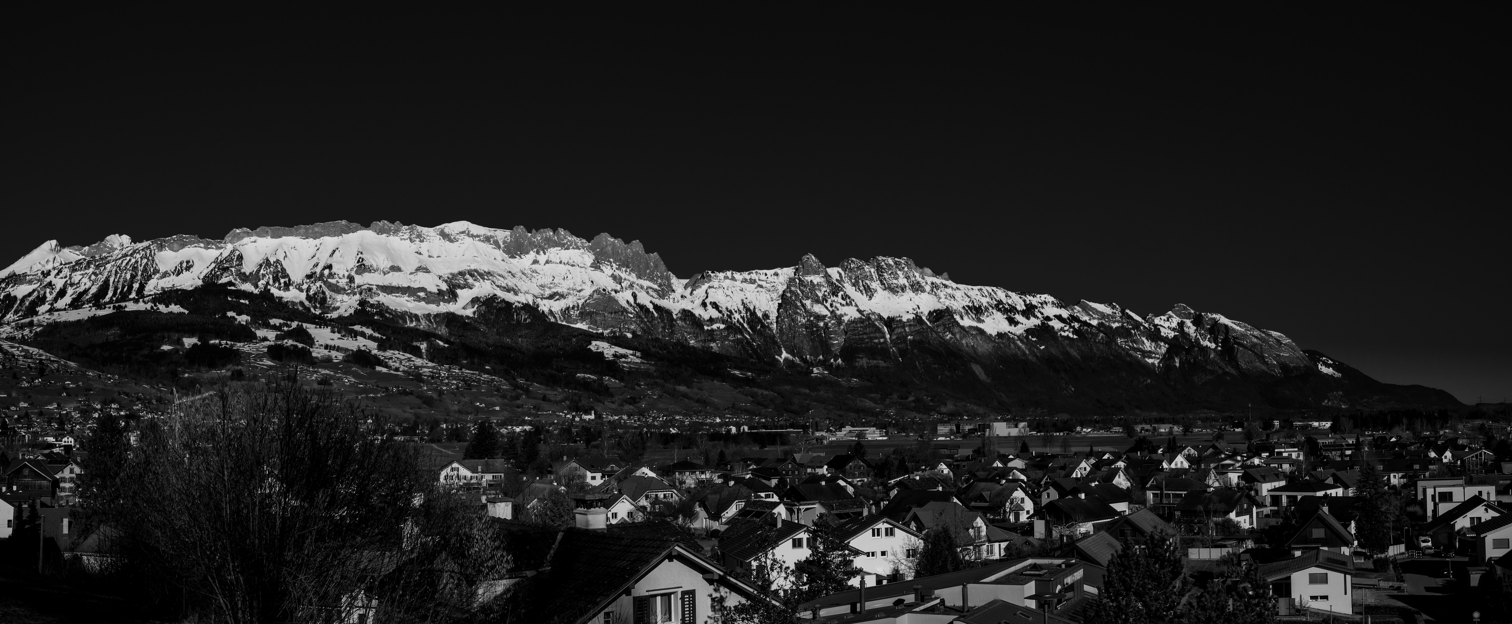 Monochrome Mountains and Urban Harmony