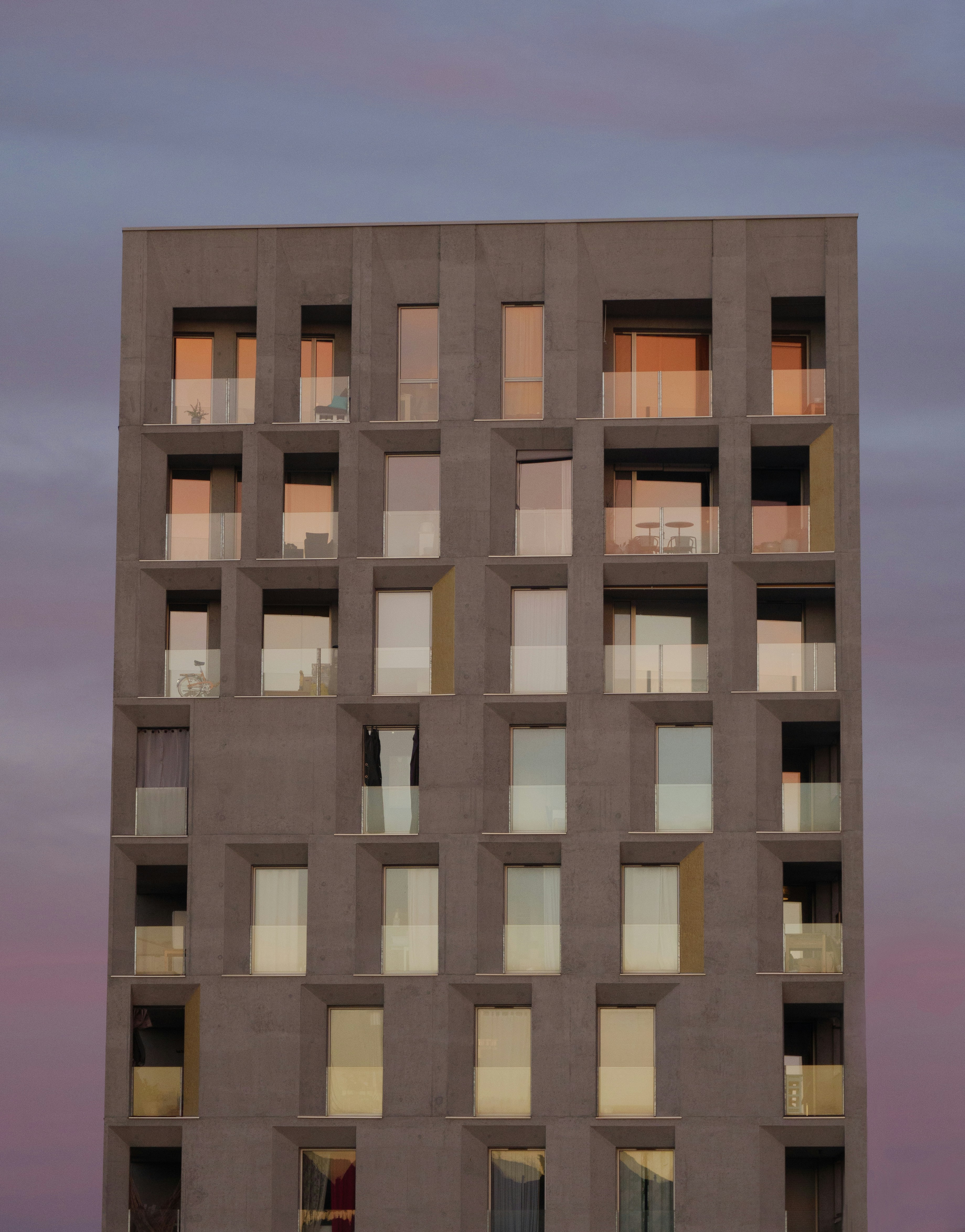 Vertical Grid: A Modern Facade Basked in Sunset Light
