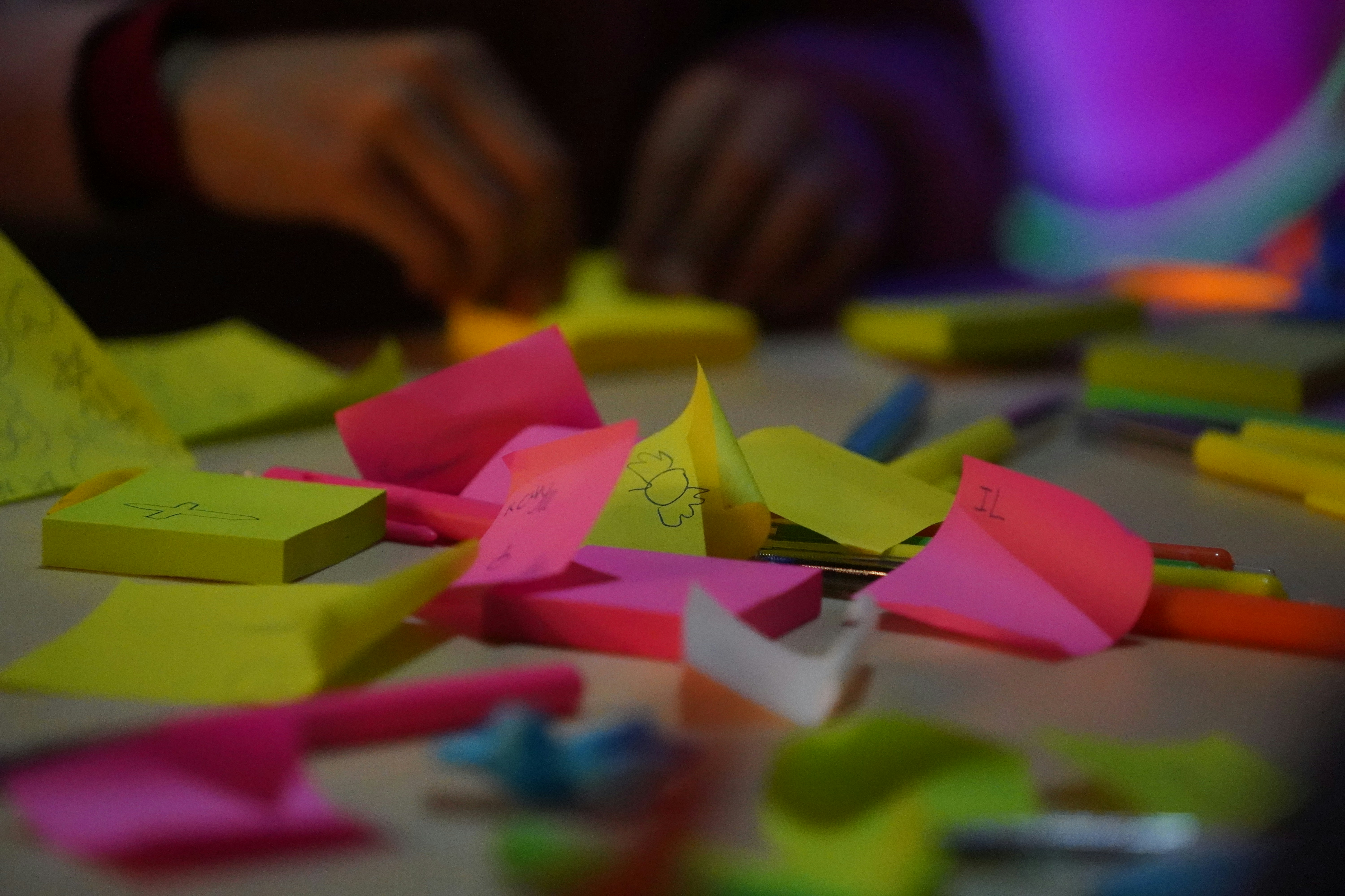 A table topped with lots of post it notes photo – Free Paper Image on ...