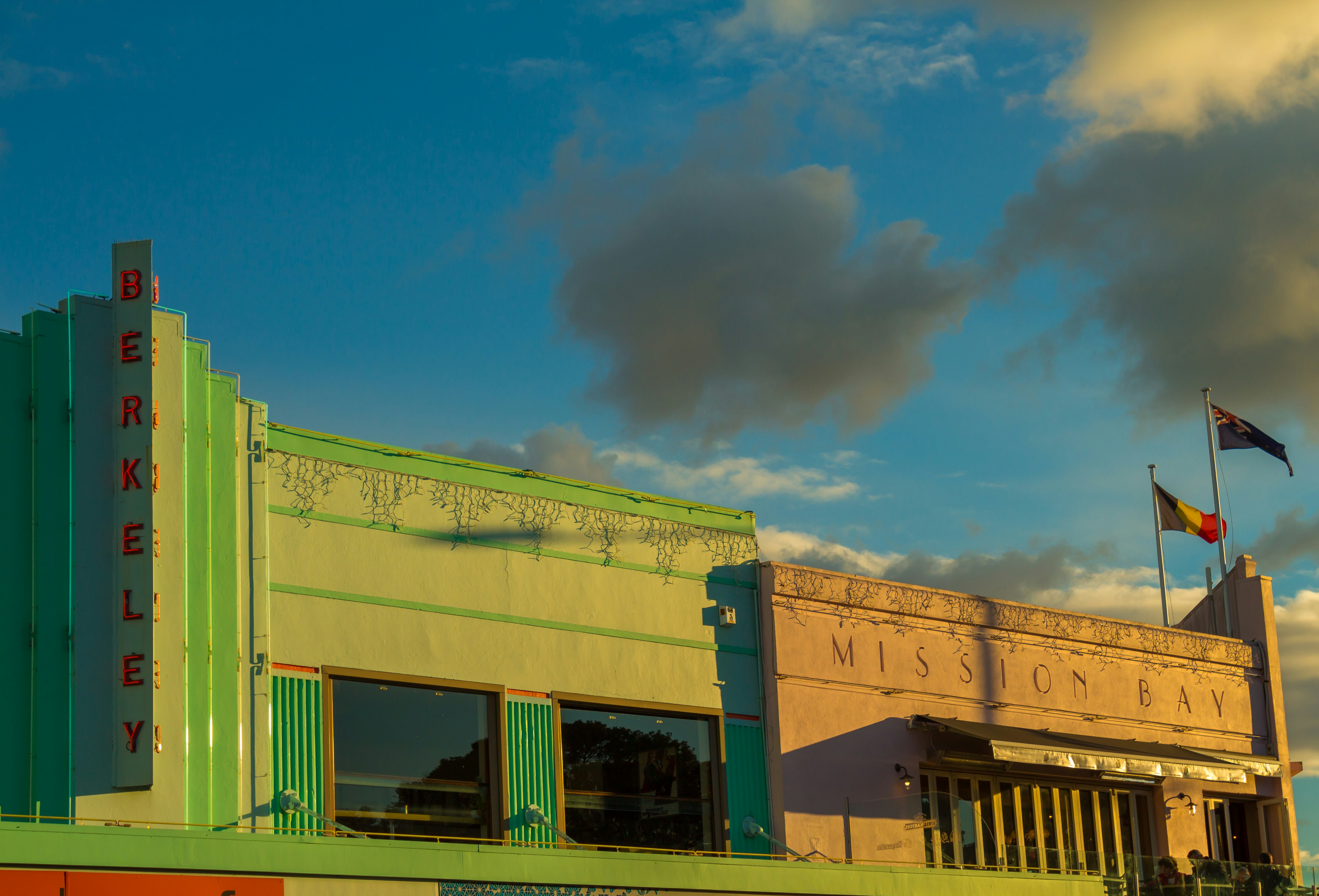 Berkeley Sign on a Green Bayfront Facade Under a Bright Sky