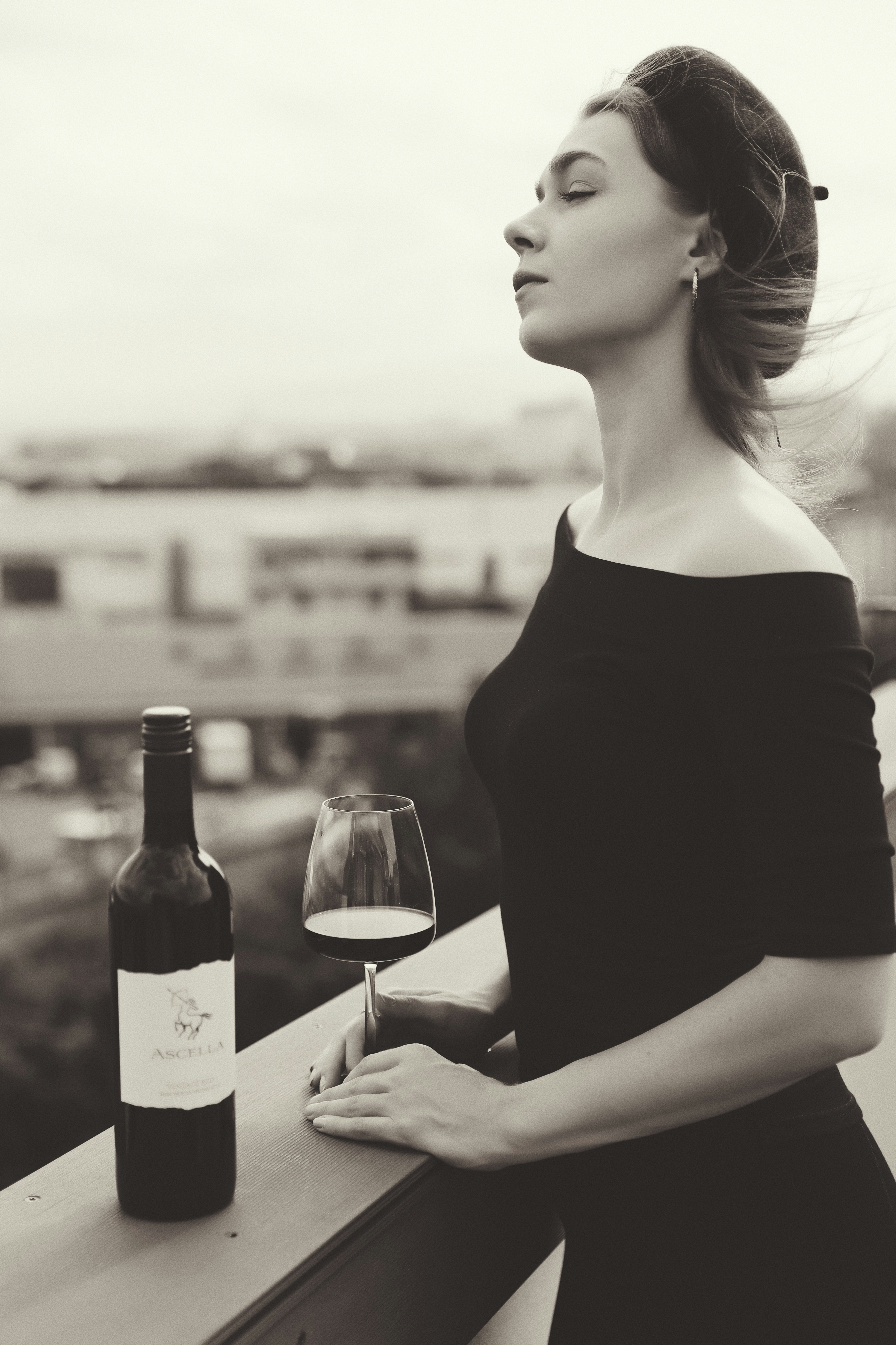 Wine, Wind, and Quiet Grace on a Rooftop