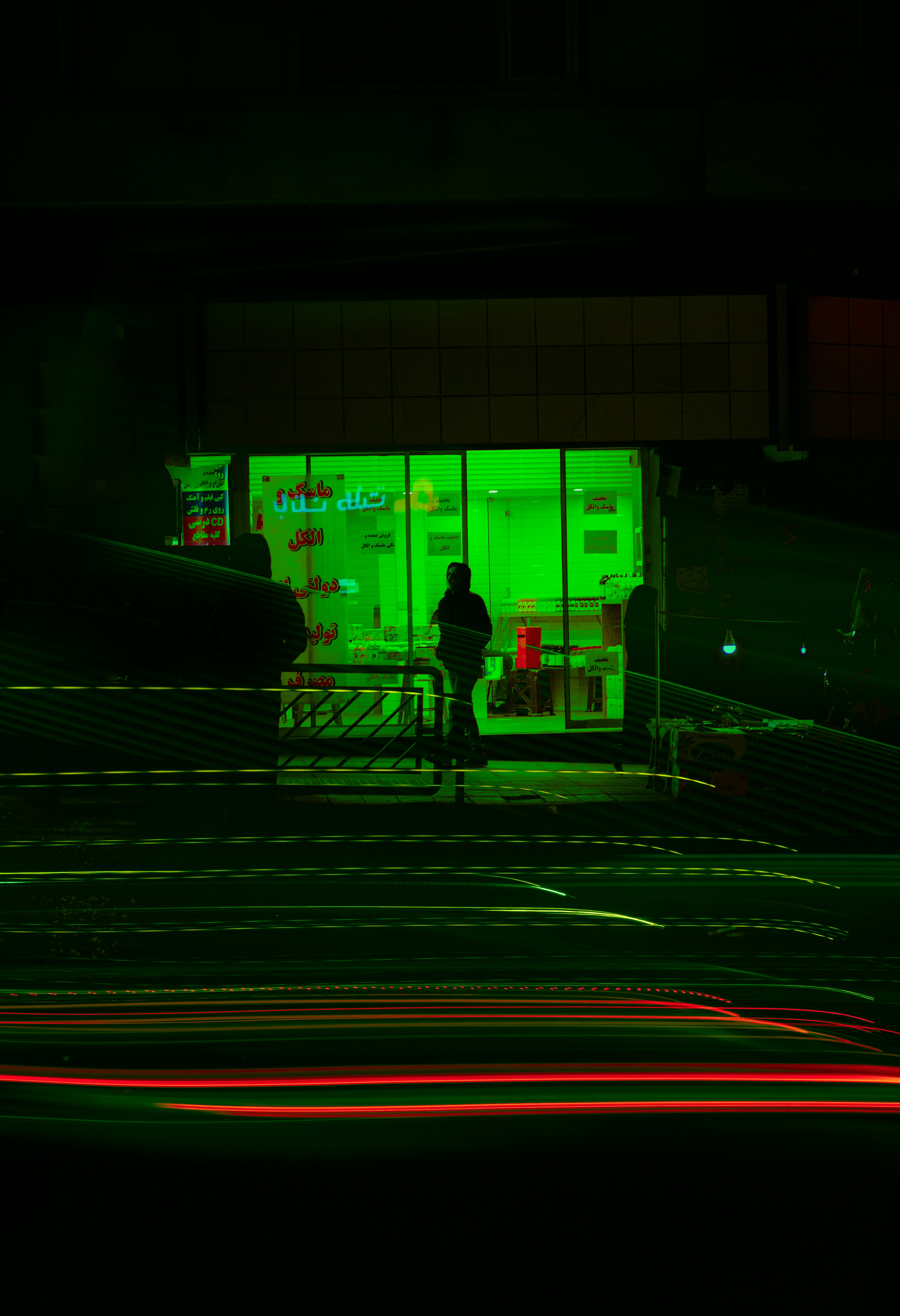 Neon Green Convenience at Night