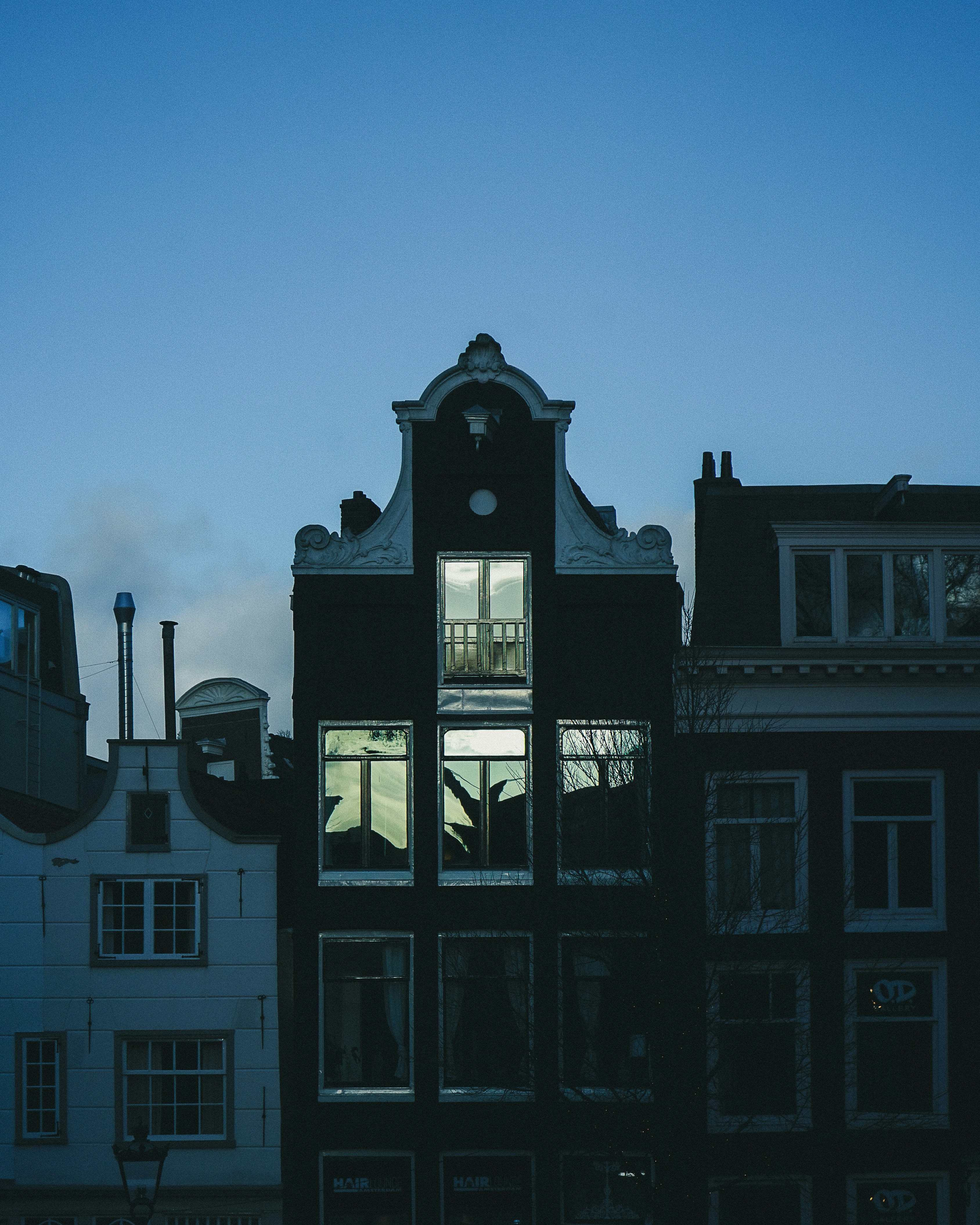 a tall building with a clock on the top of it