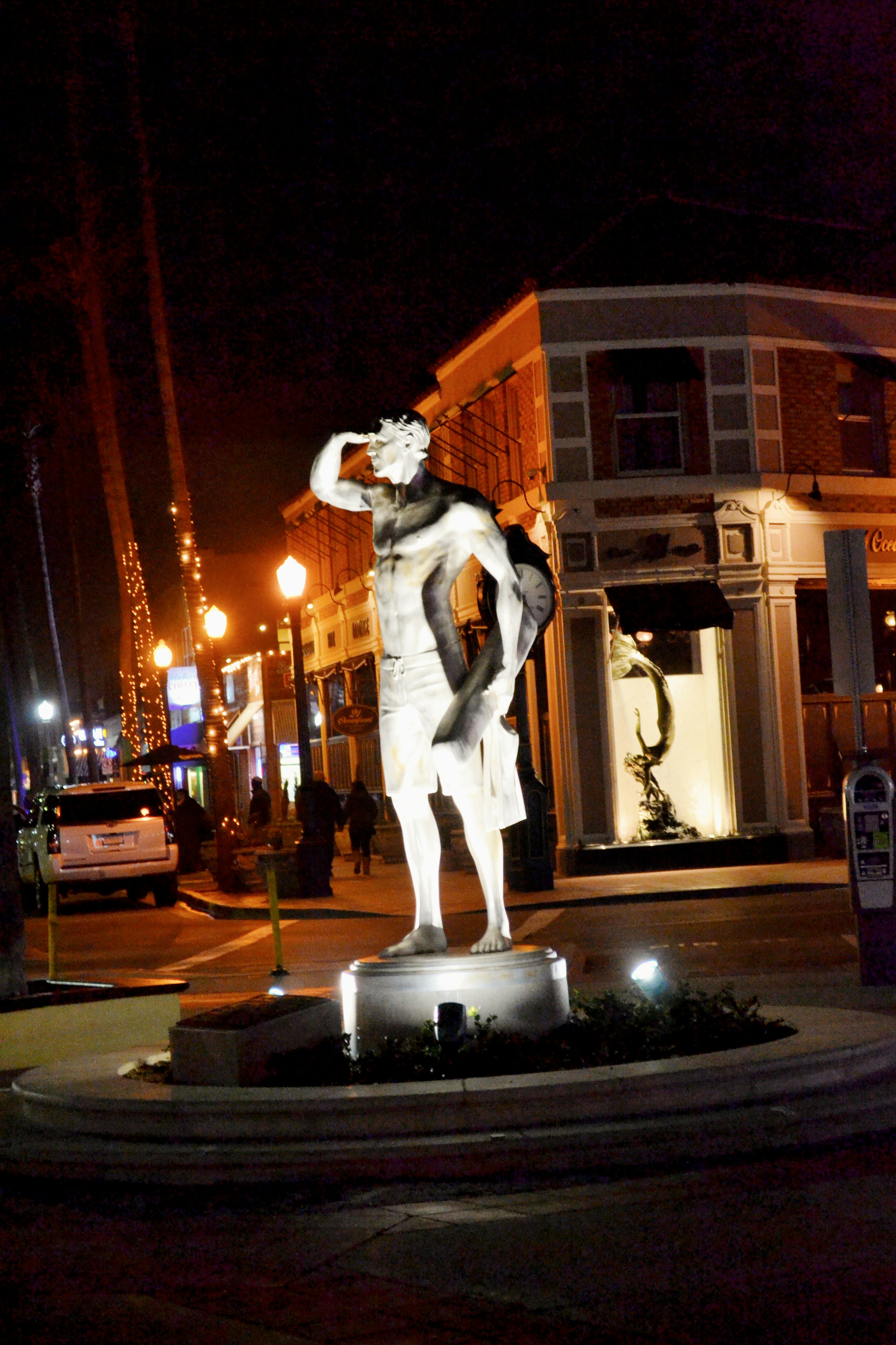 Night Pedestal: The White Sentinel Anchoring a Quiet Town Circle