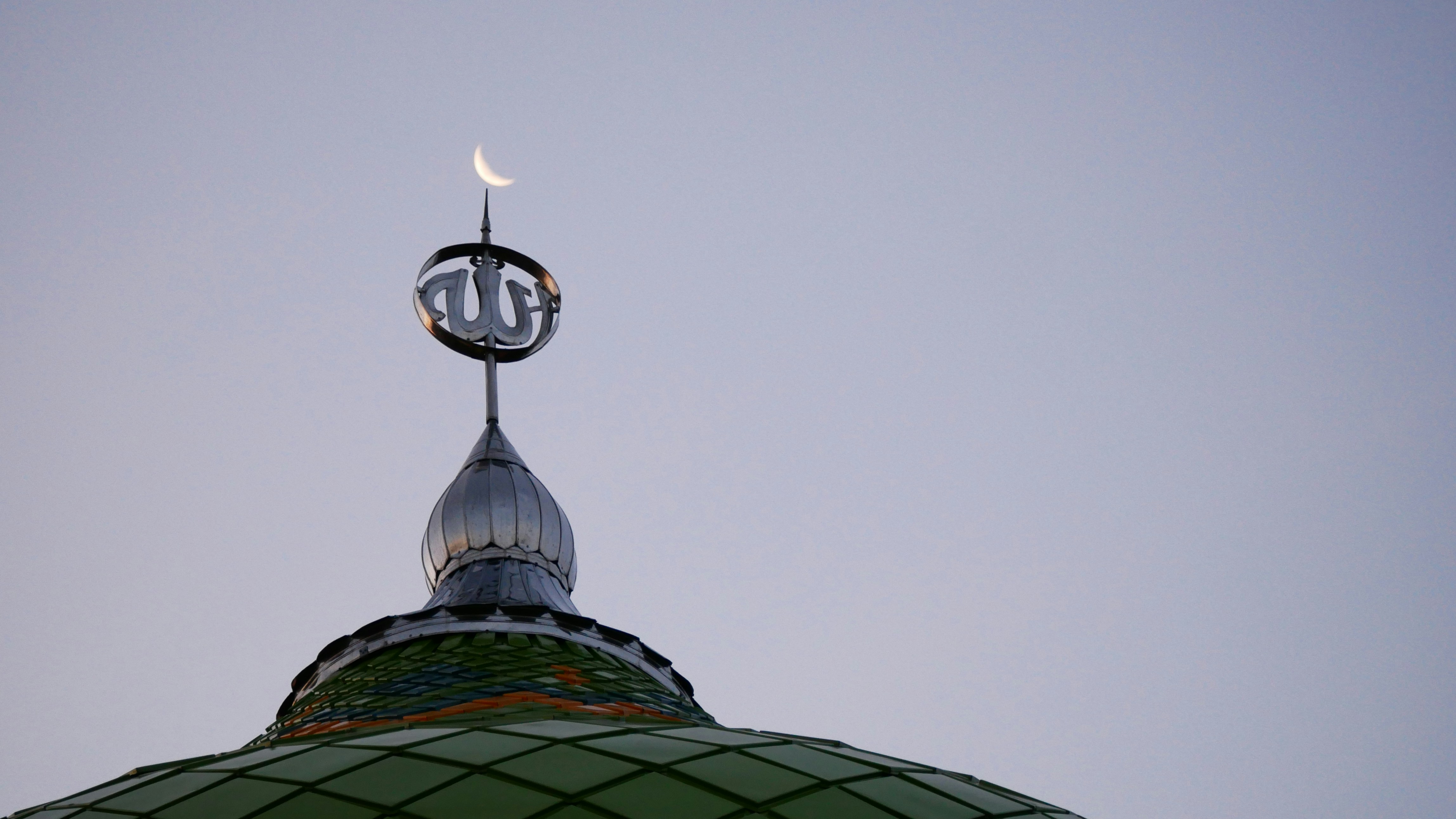 Crescent Crown: A Moonlit Weather Vane Tops a Turret