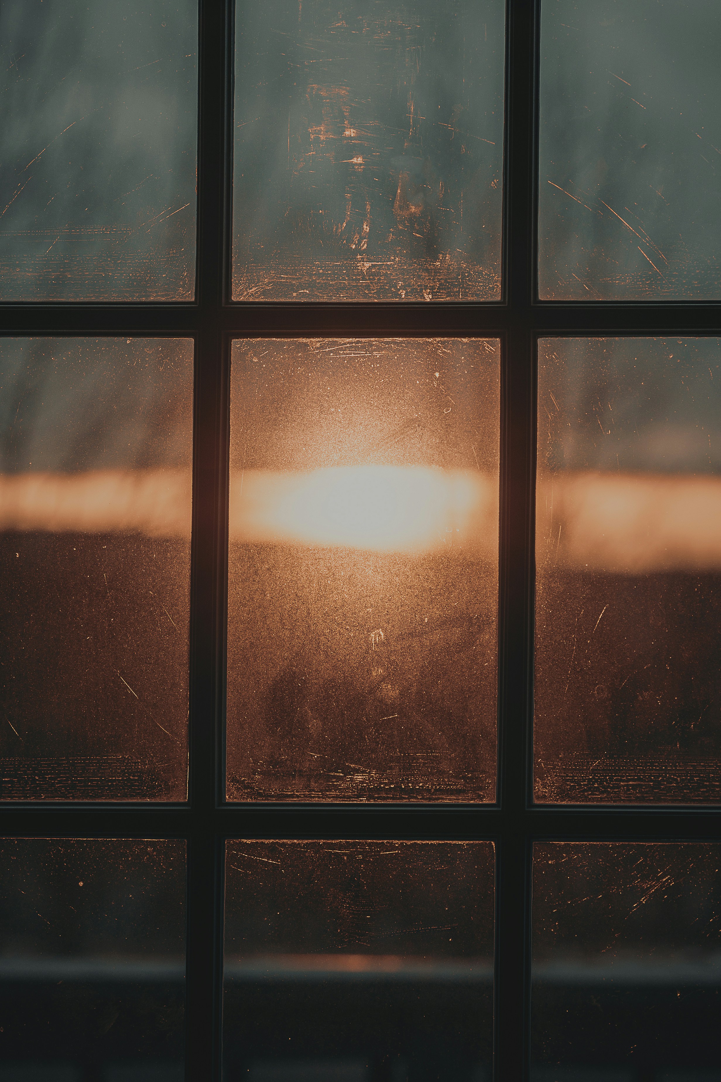 The sun is shining through the window of a building photo – Free Window ...