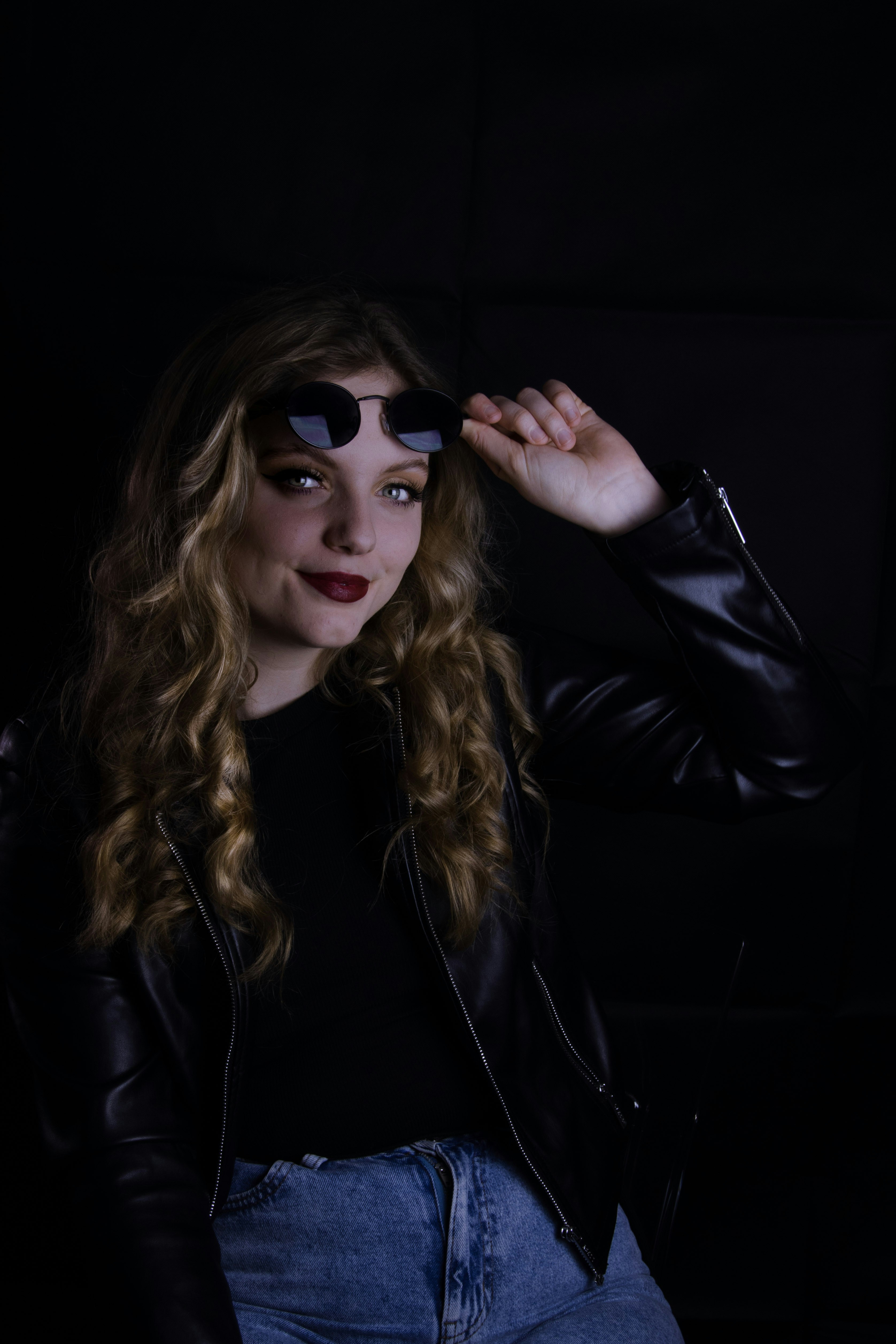 Midnight Rebel: Shaded Glance Under Chrome Sunglasses