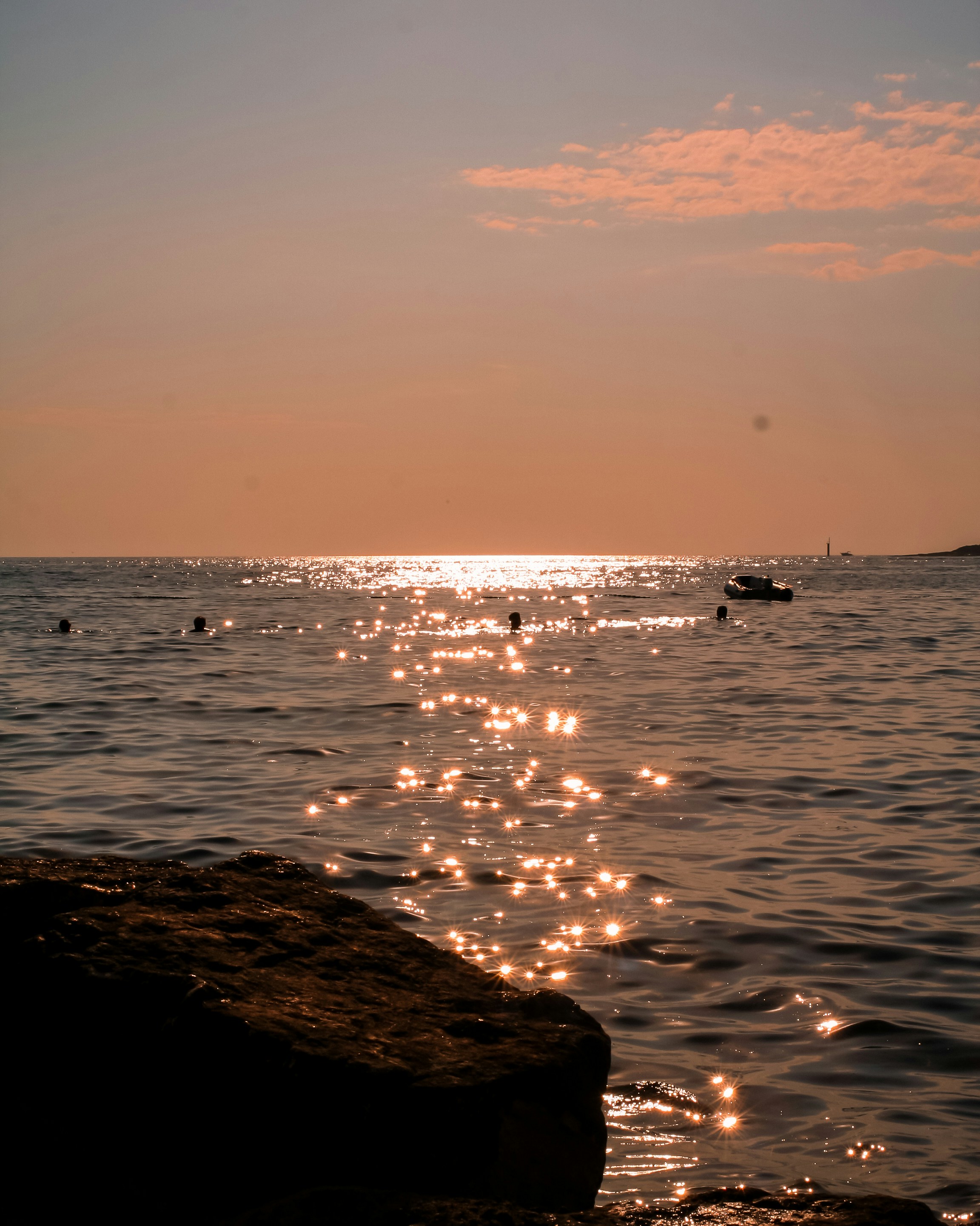 a body of water with a boat in the distance
