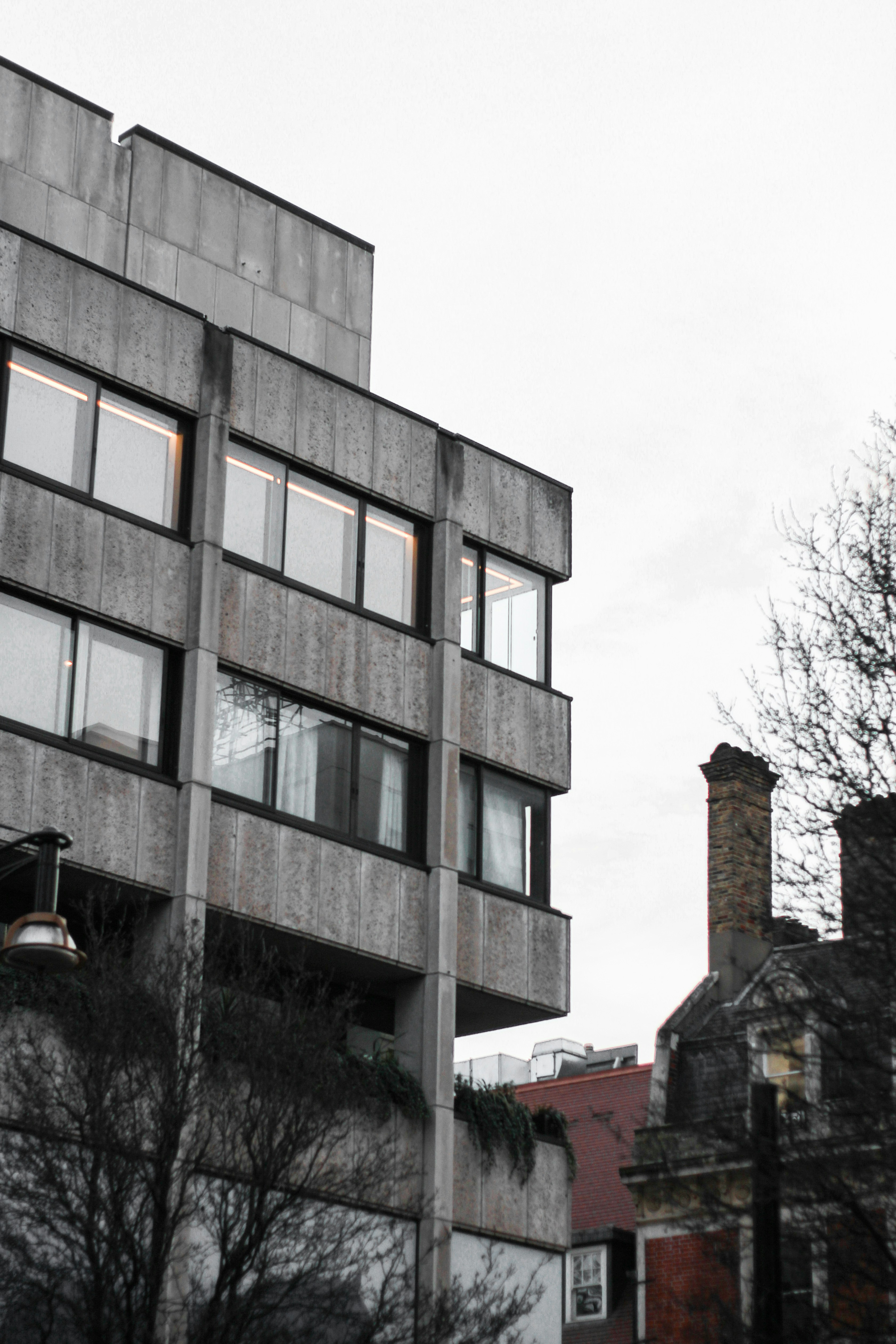 Axis of Windows: Warm Light in a Concrete Grid