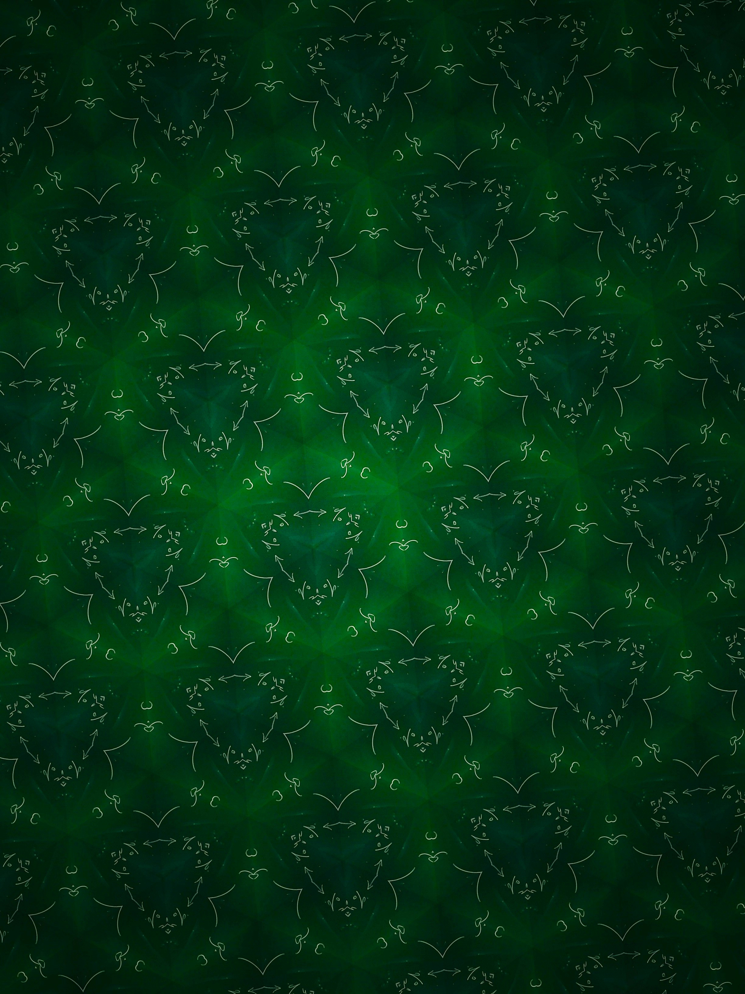 A textured green pattern featuring subtle organic shapes and flowing lines, evoking a sense of harmony with nature.