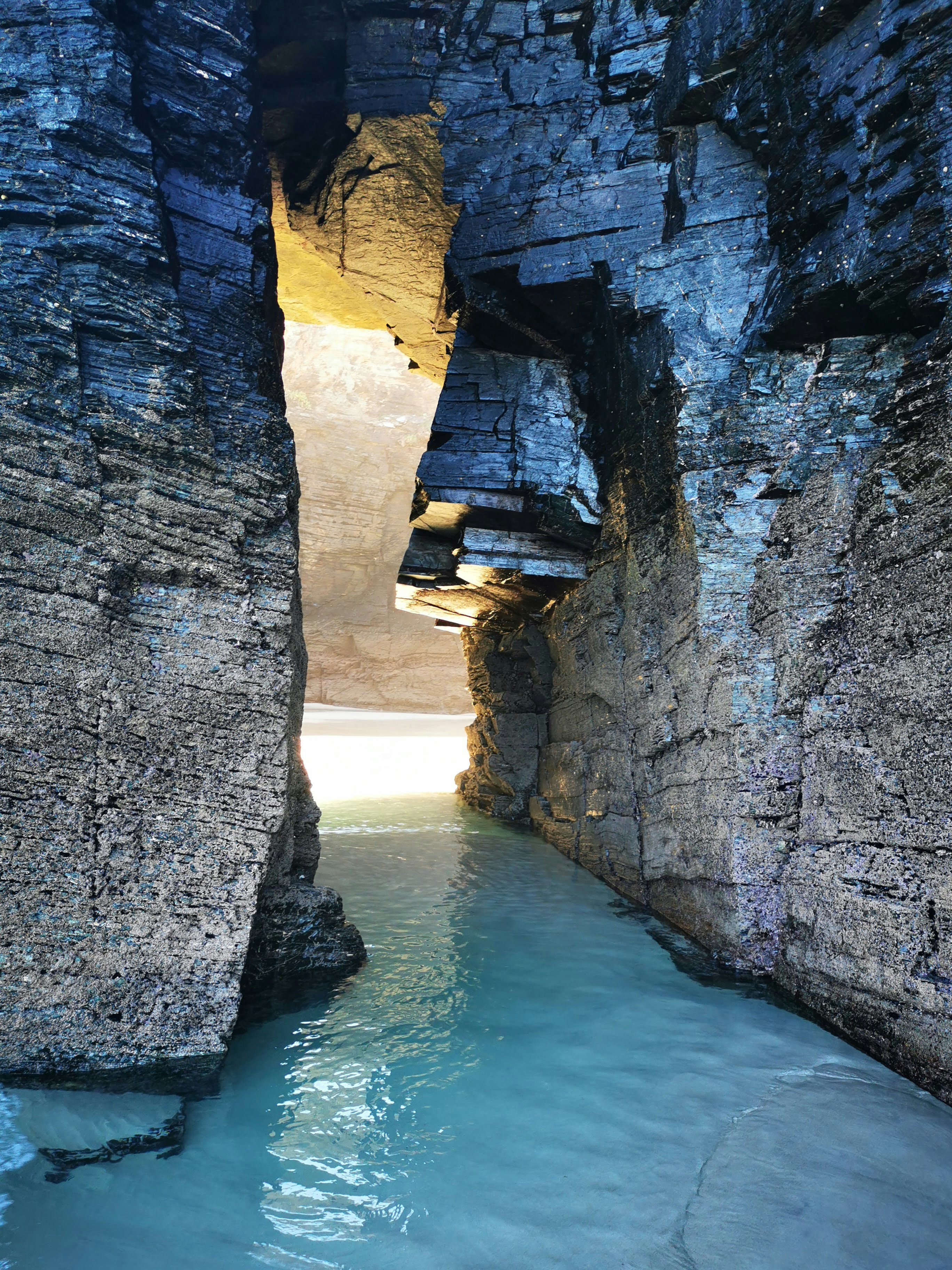A narrow river in a canyon between two large rocks photo – Free Praia ...