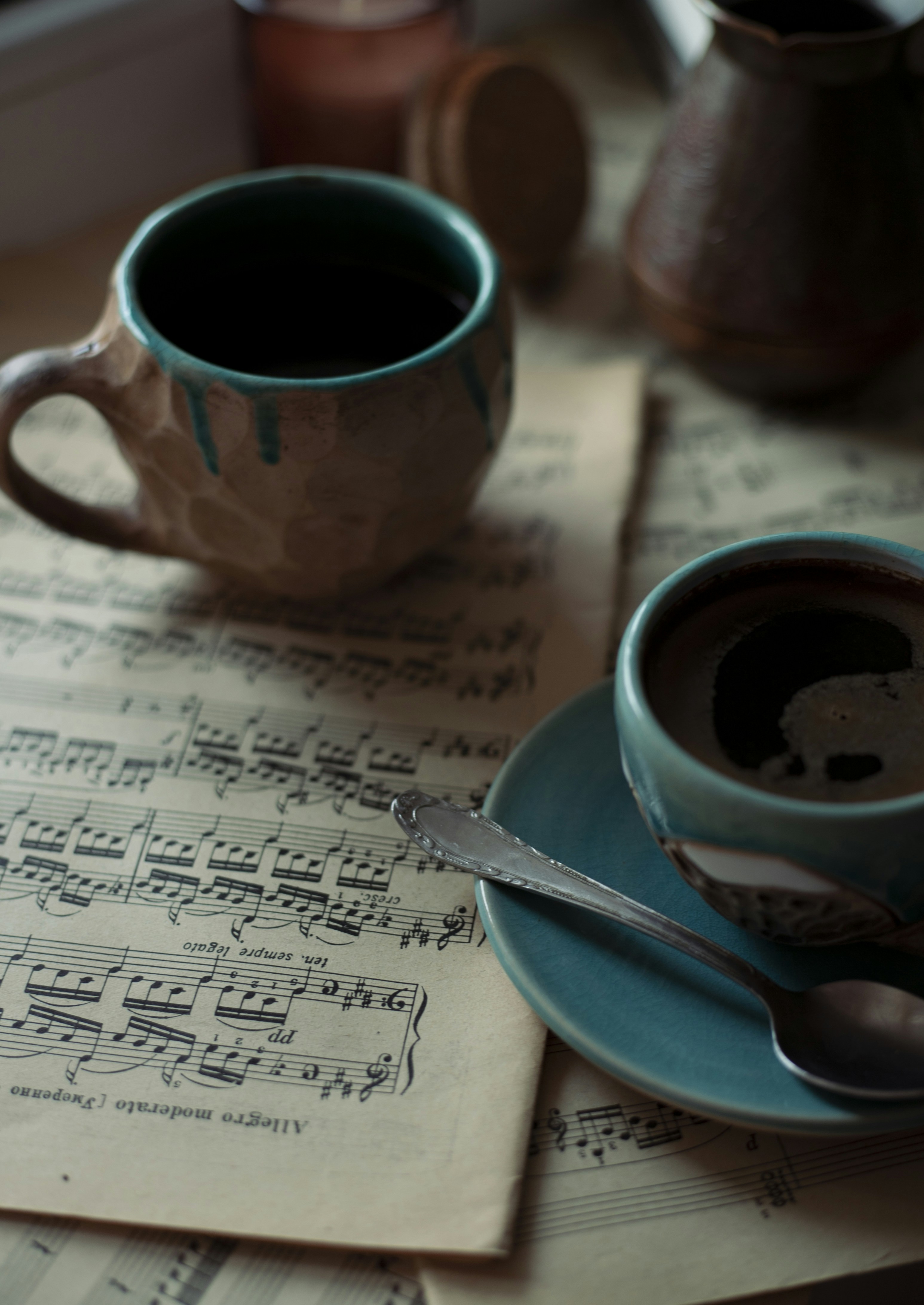 Ceramic Coffee Scene on Aged Sheet Music