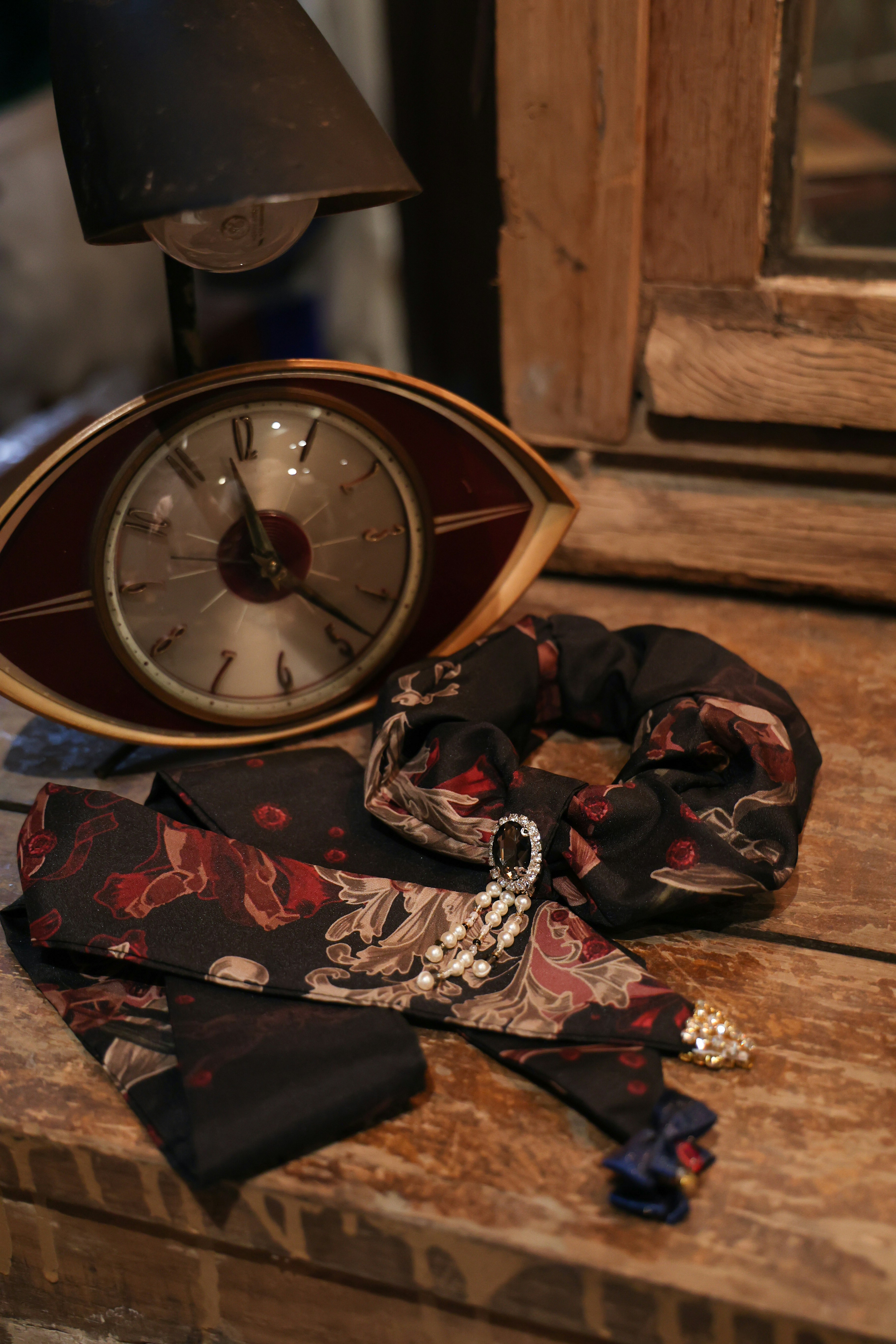 A clock and a scarf on a table photo – Free Accessories Image on Unsplash