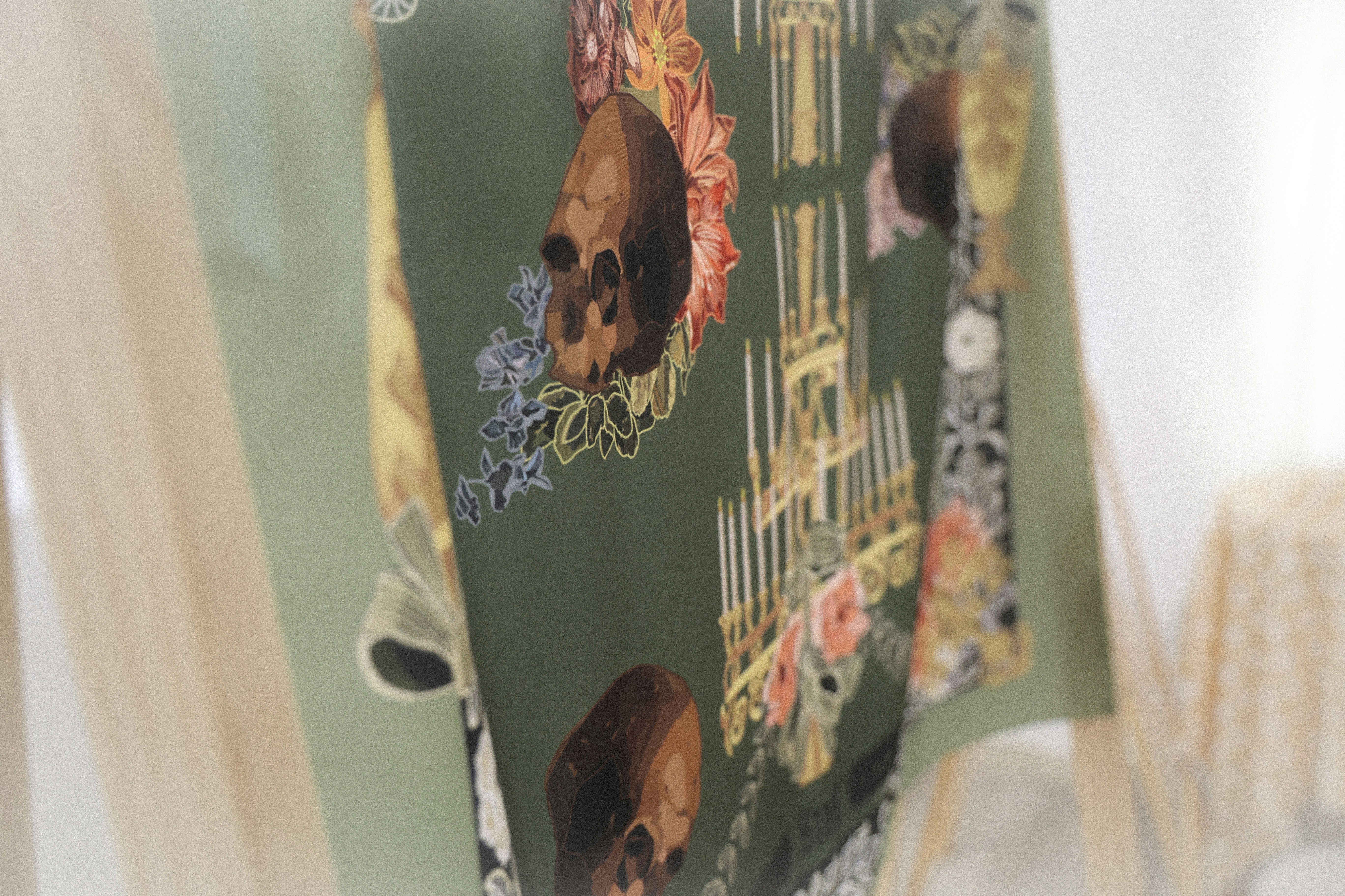 a close up of a piece of paper with a skull on it