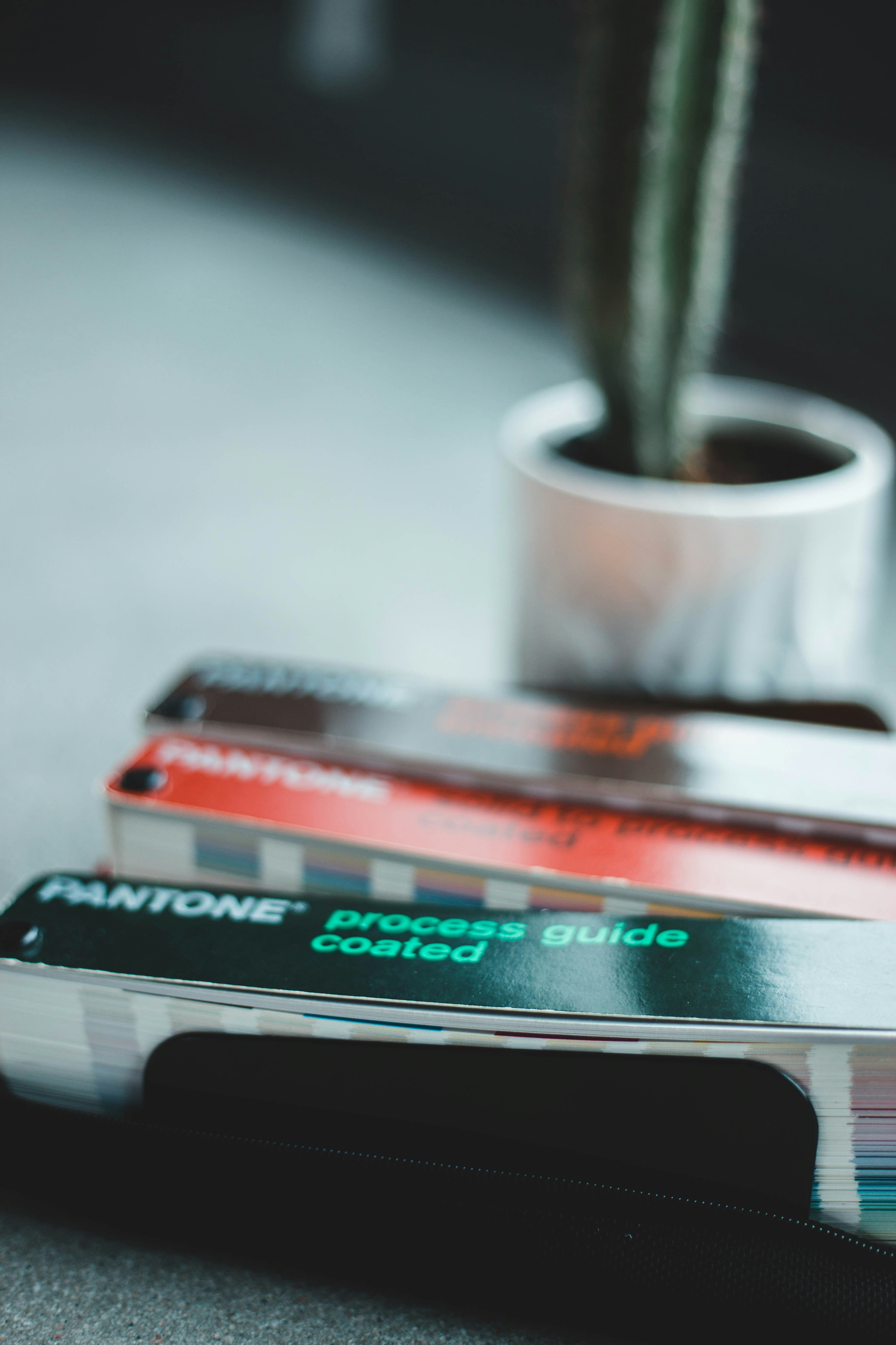 A couple of business cards sitting on top of a table photo – Free Blue ...