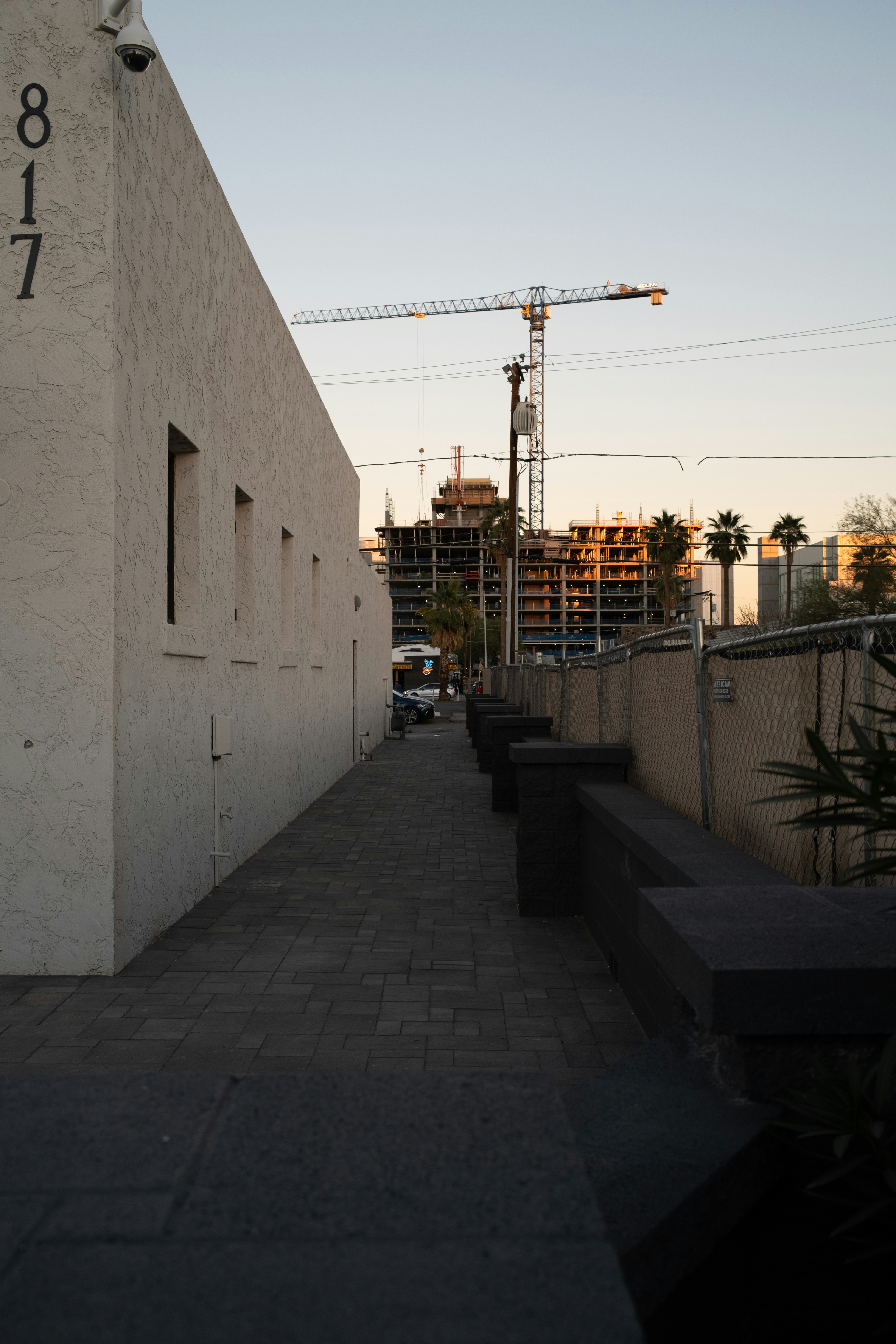 Crane at Dusk: A Linear Walk Toward the City's Growing Edge