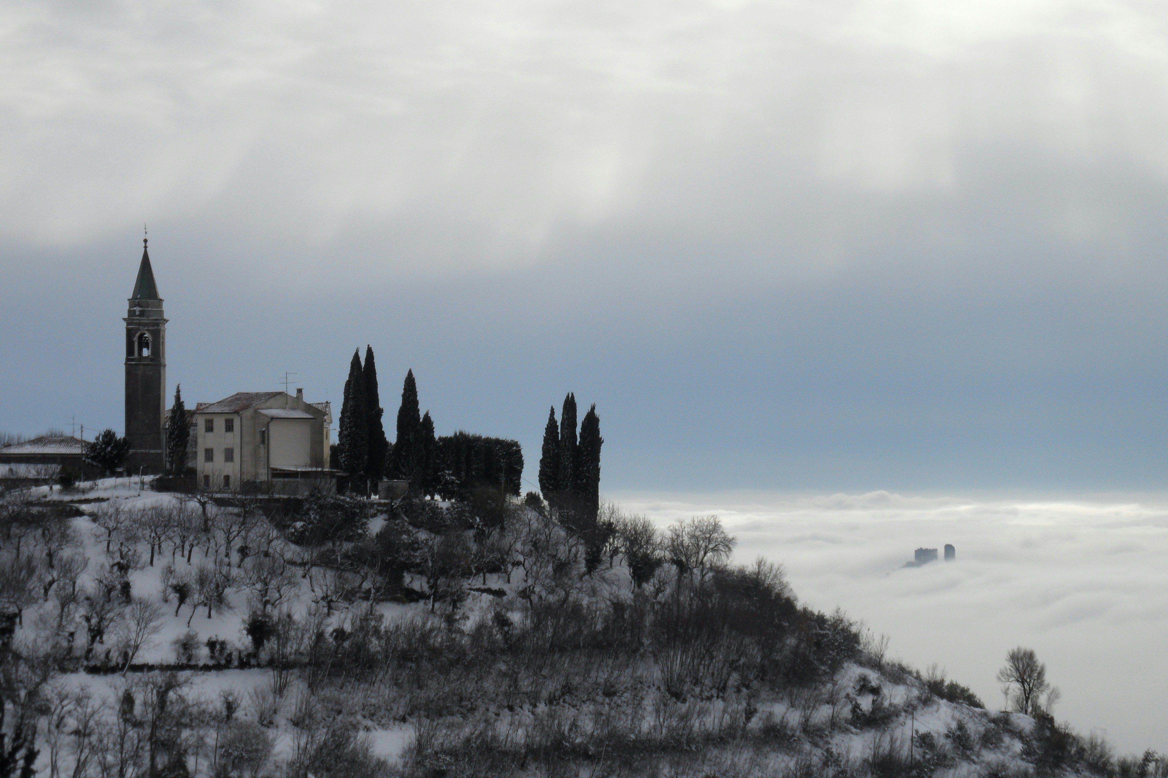 Hilltop Sanctuary Surrounded by Sea of Clouds