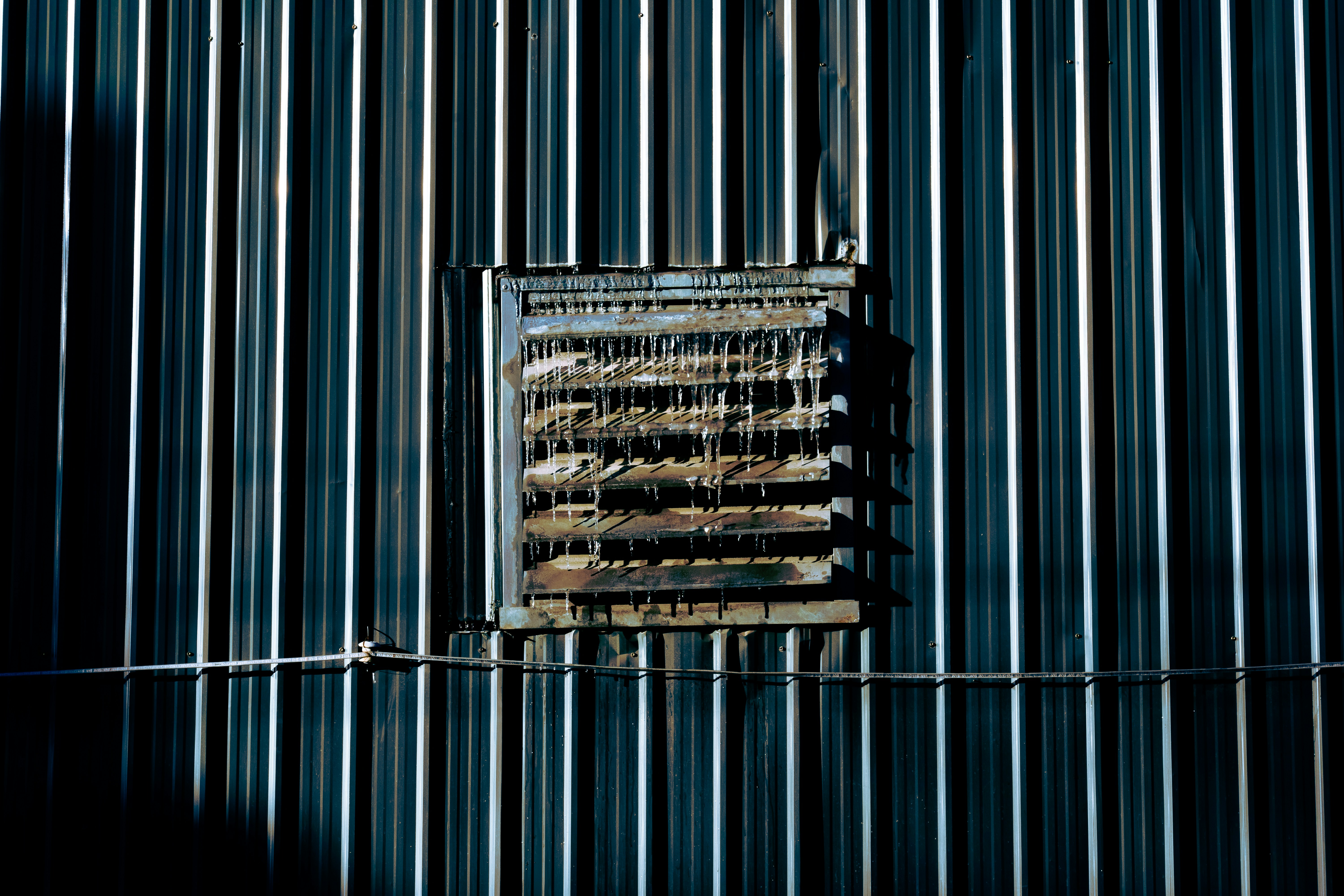 Indigo Vent with Dripping Icicles: Geometry of Cold
