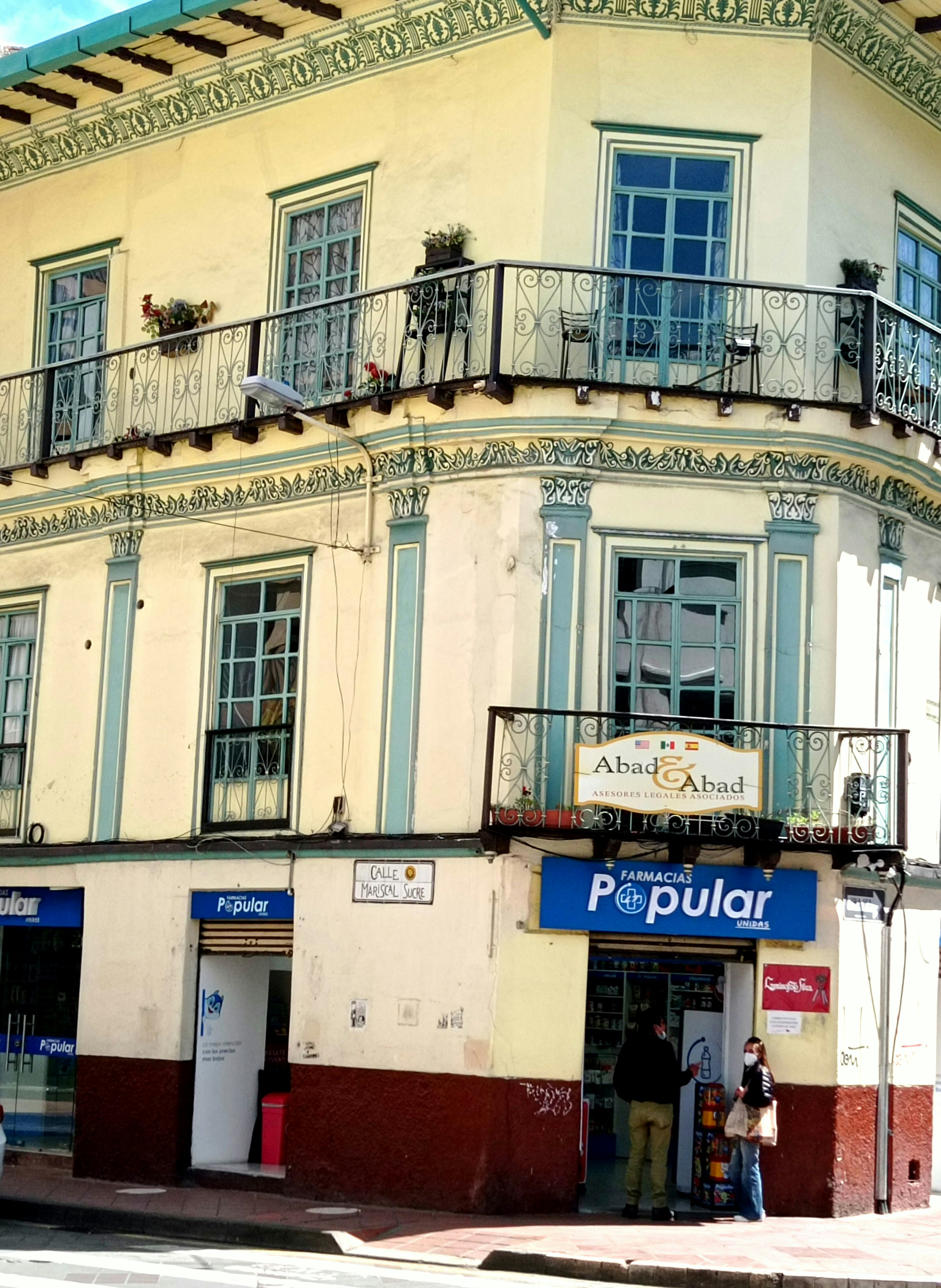 A building that has a bunch of windows on it photo – Free Cuenca Image ...