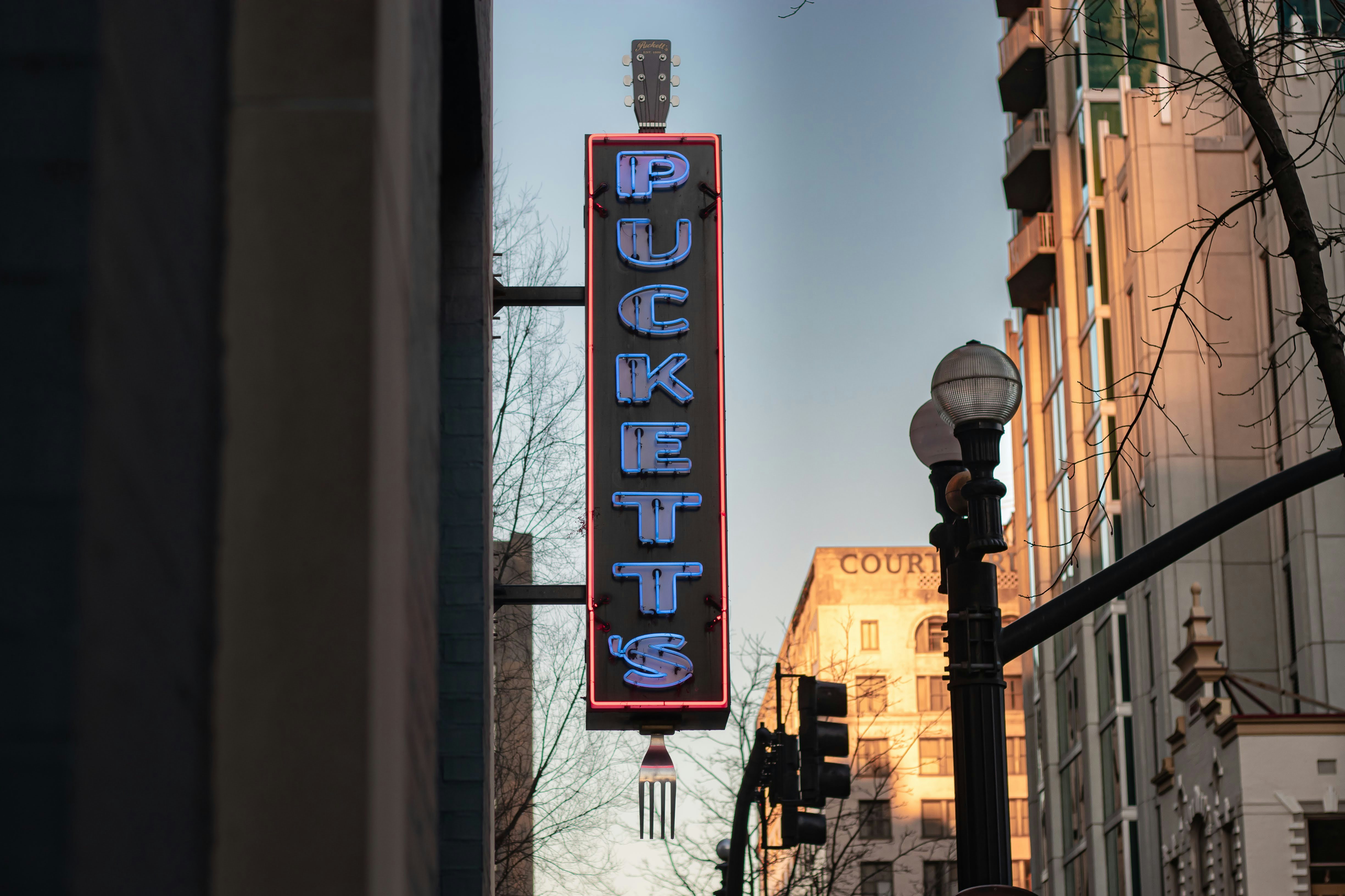 Neon Sign Descent: A Narrow Alleyway of Light