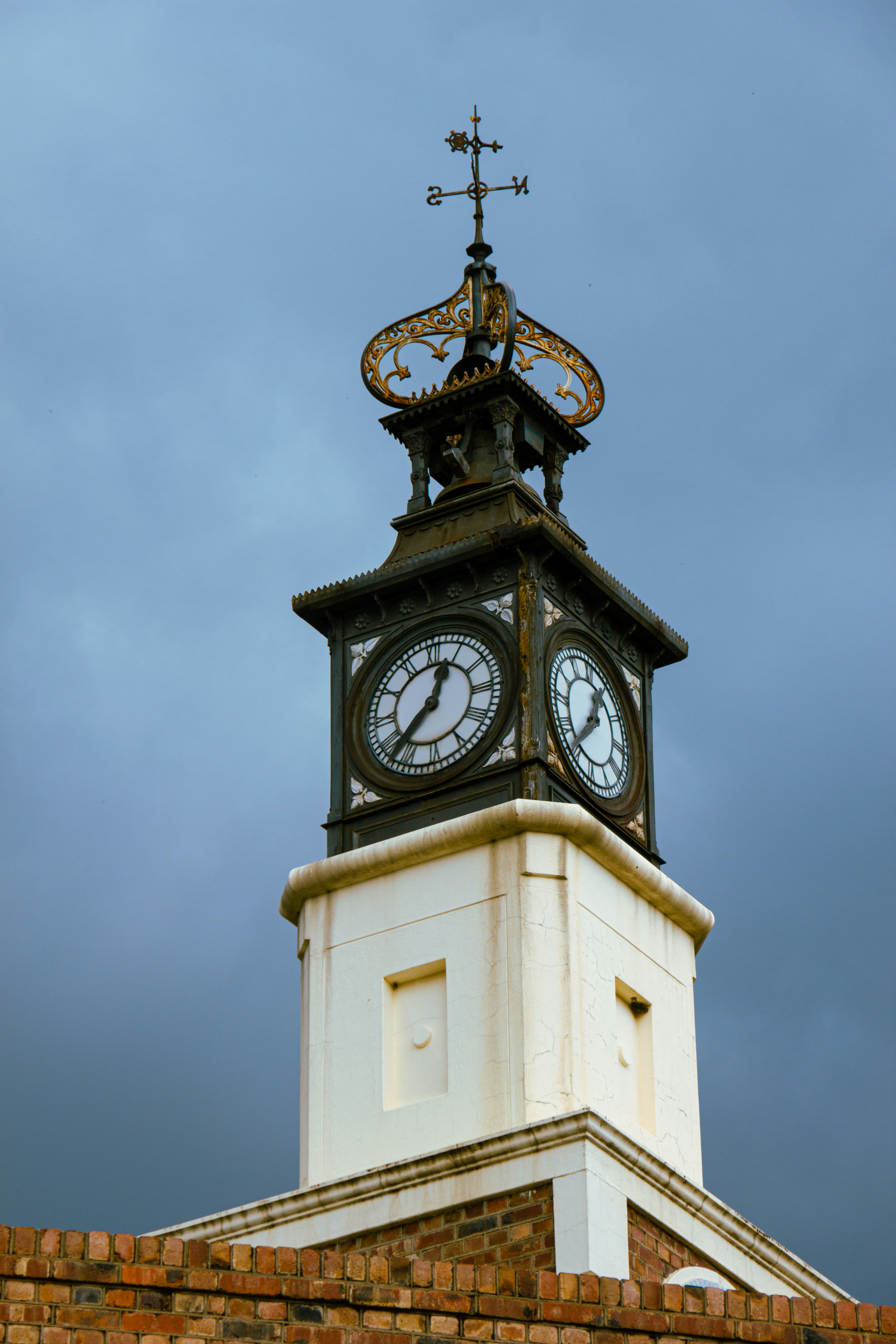 A clock tower with a cross on top of it photo – Free Kimberley Image on ...