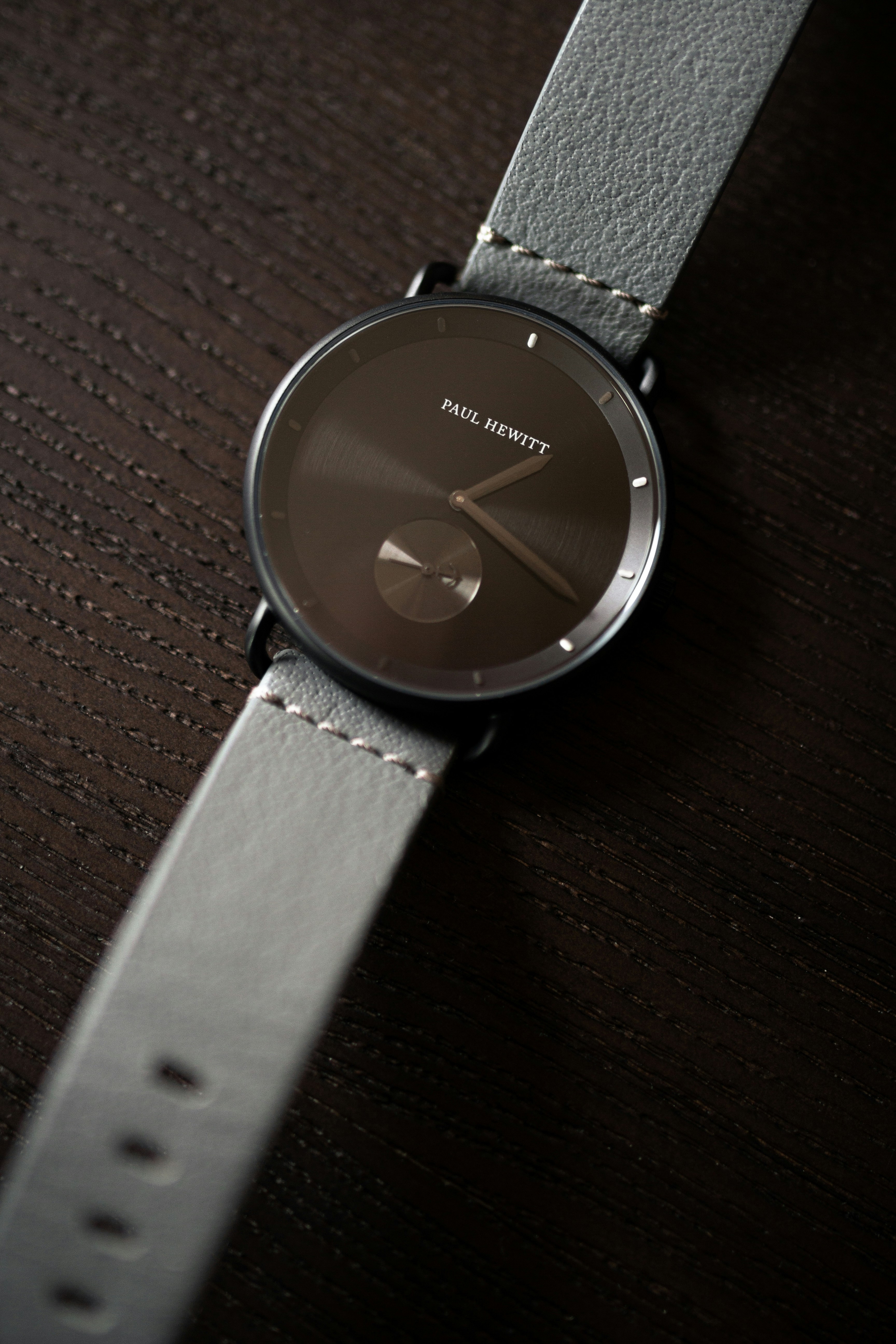 a close up of a watch on a table
