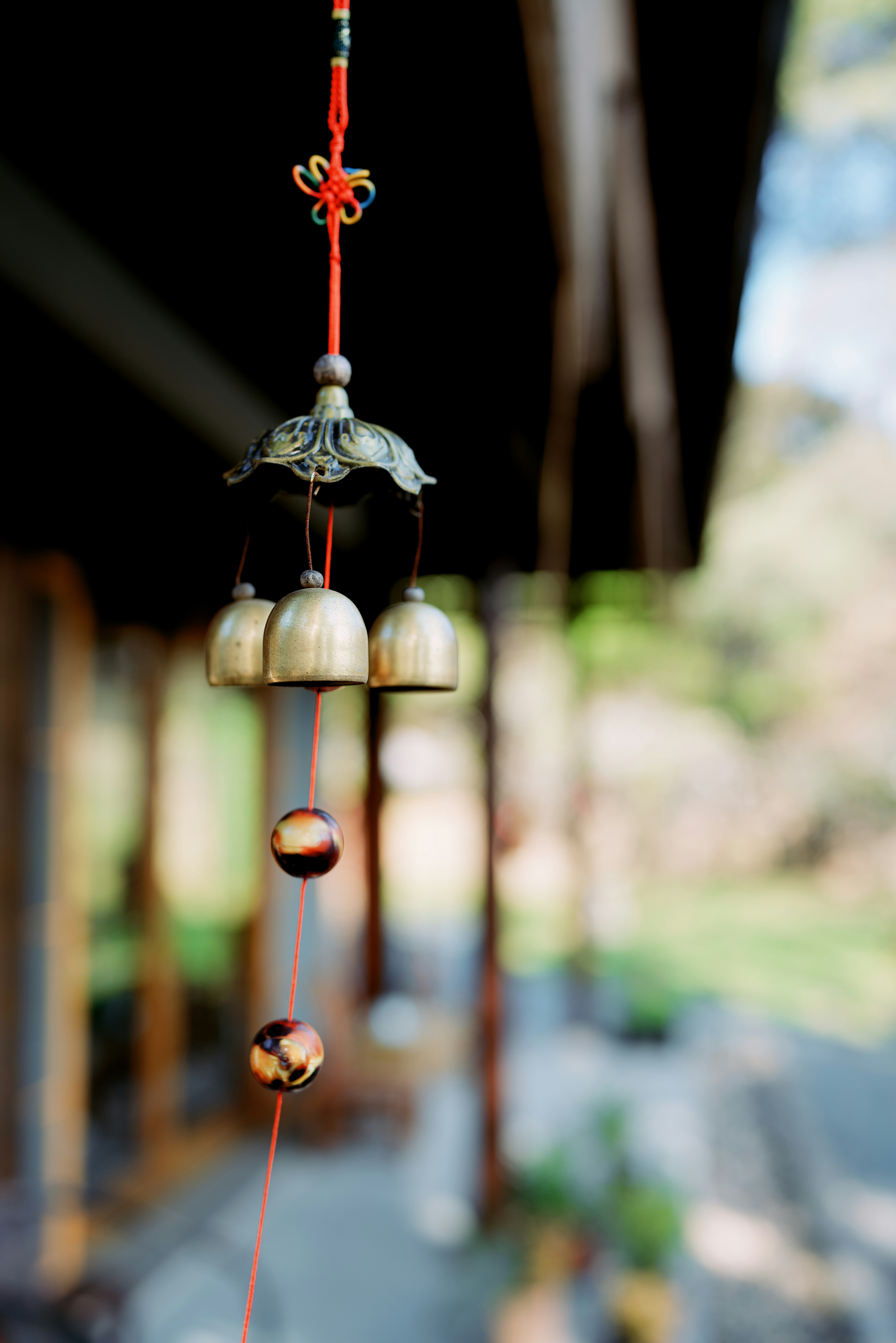 A bell hanging from a pole with bells attached to it photo – Free Wuxi ...