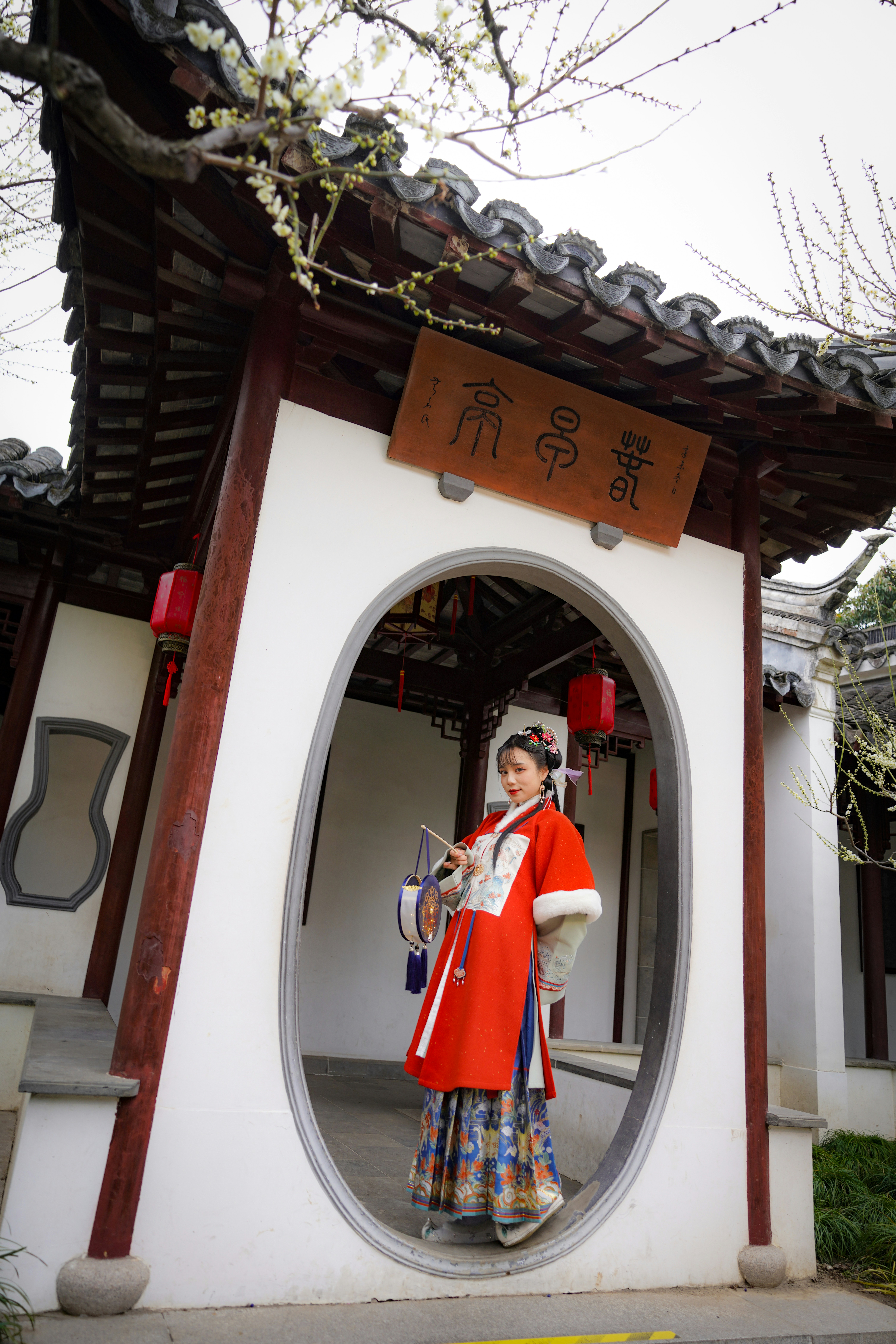 Red Robe at the Moon Gate: Portrait in a Quiet Chinese Courtyard