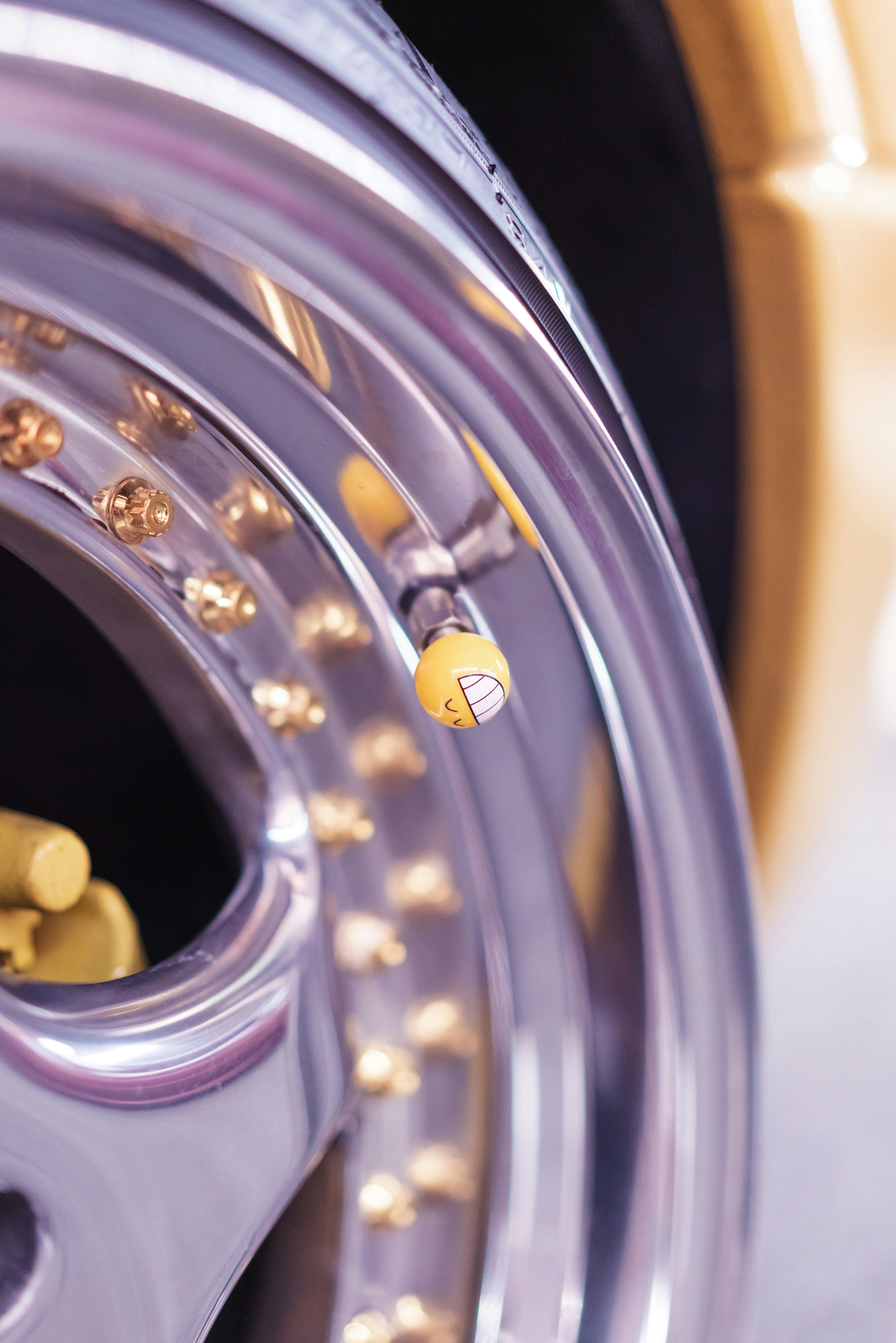 A close up of a tire with gold rivets photo – Free Usa Image on Unsplash