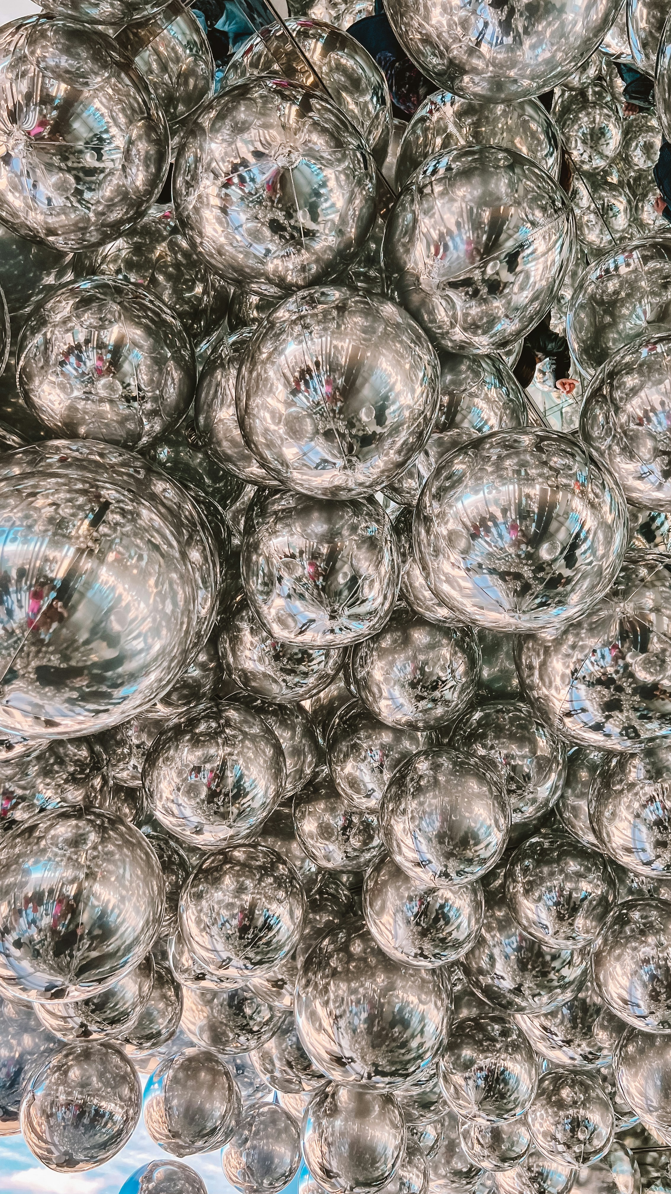 Summit One Vanderbilt NCY | a bunch of glass balls sitting on top of a table