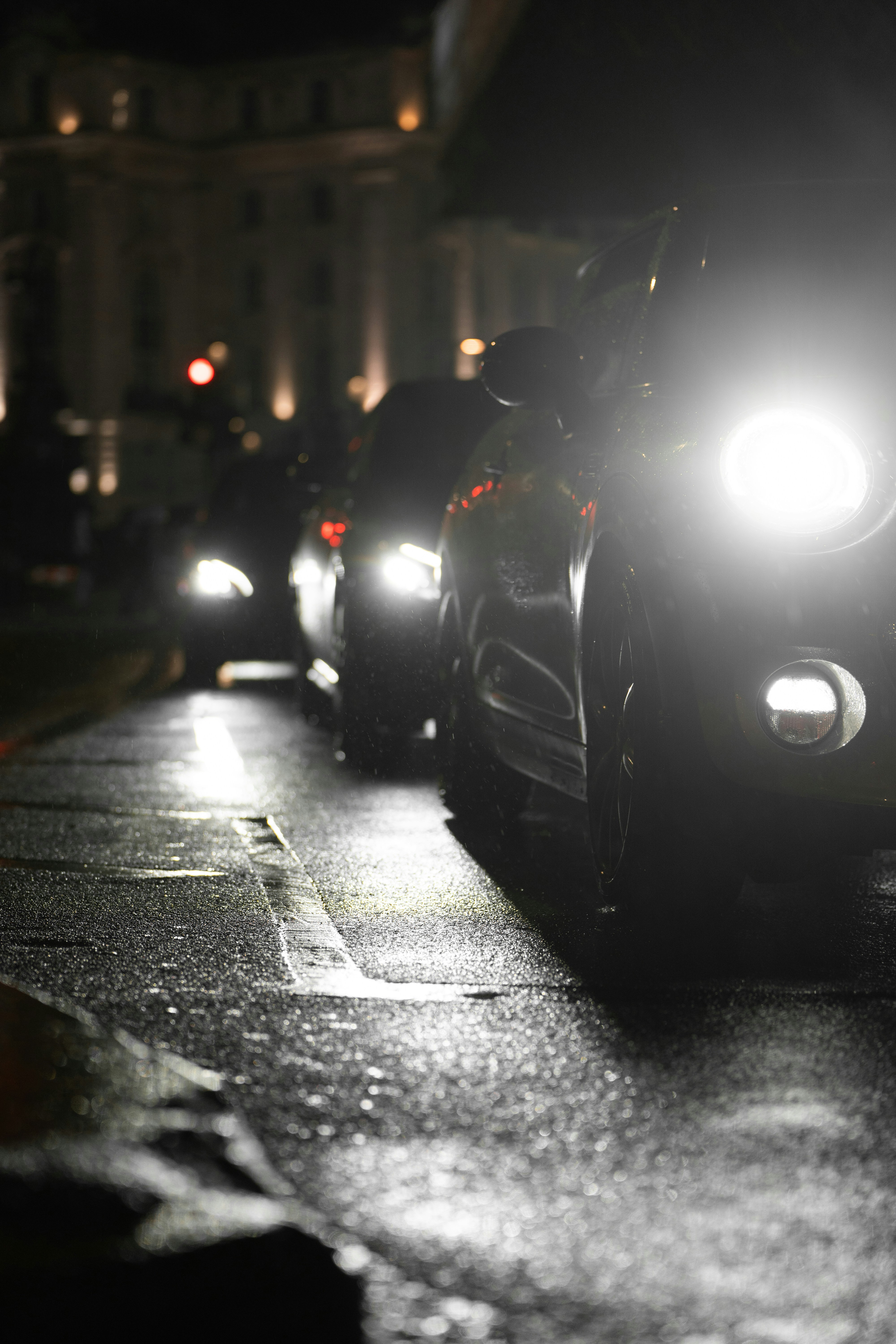 Neon Lines: A Wet-Street Parade of Headlights