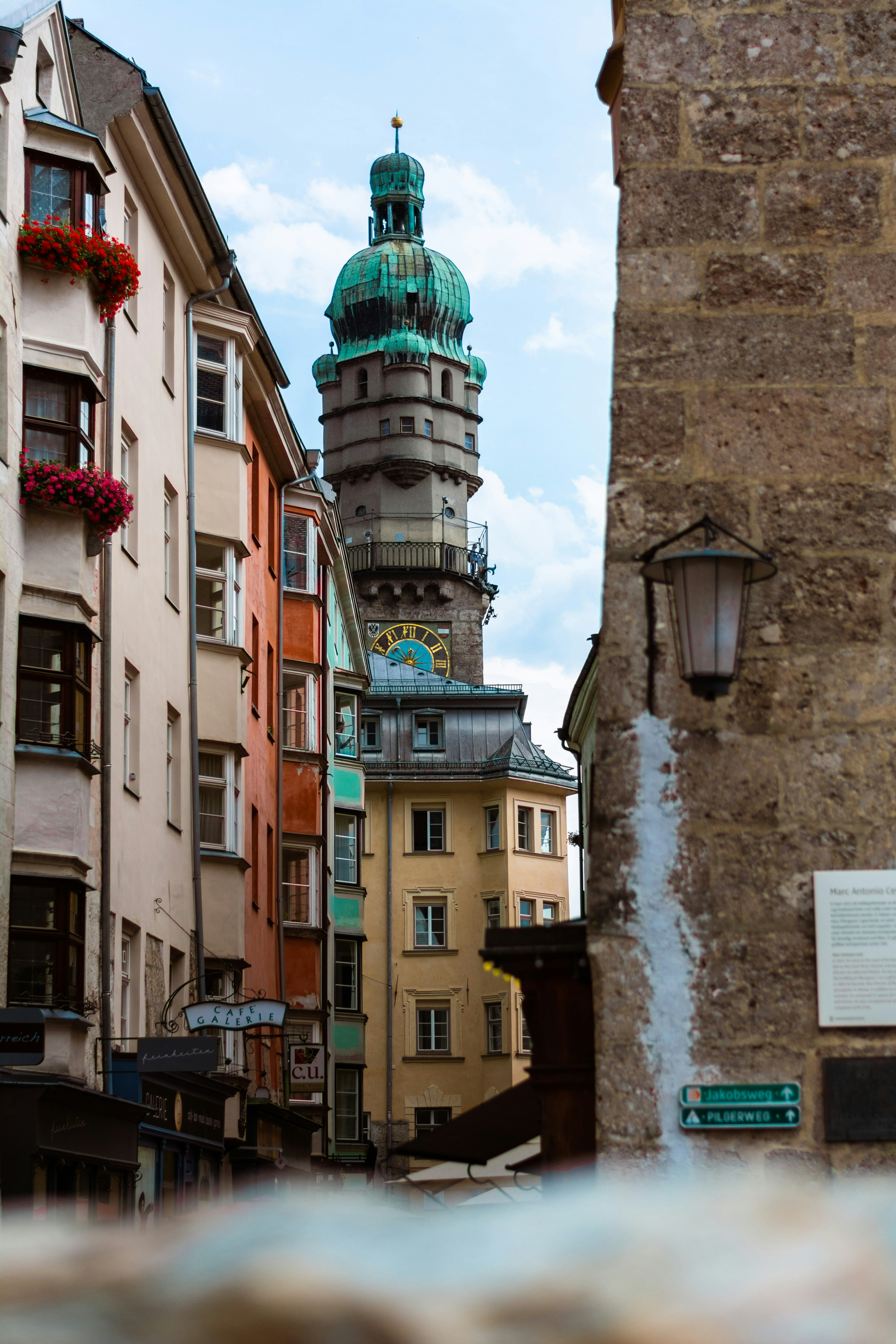 Clock Tower Amongst Colorful Facades