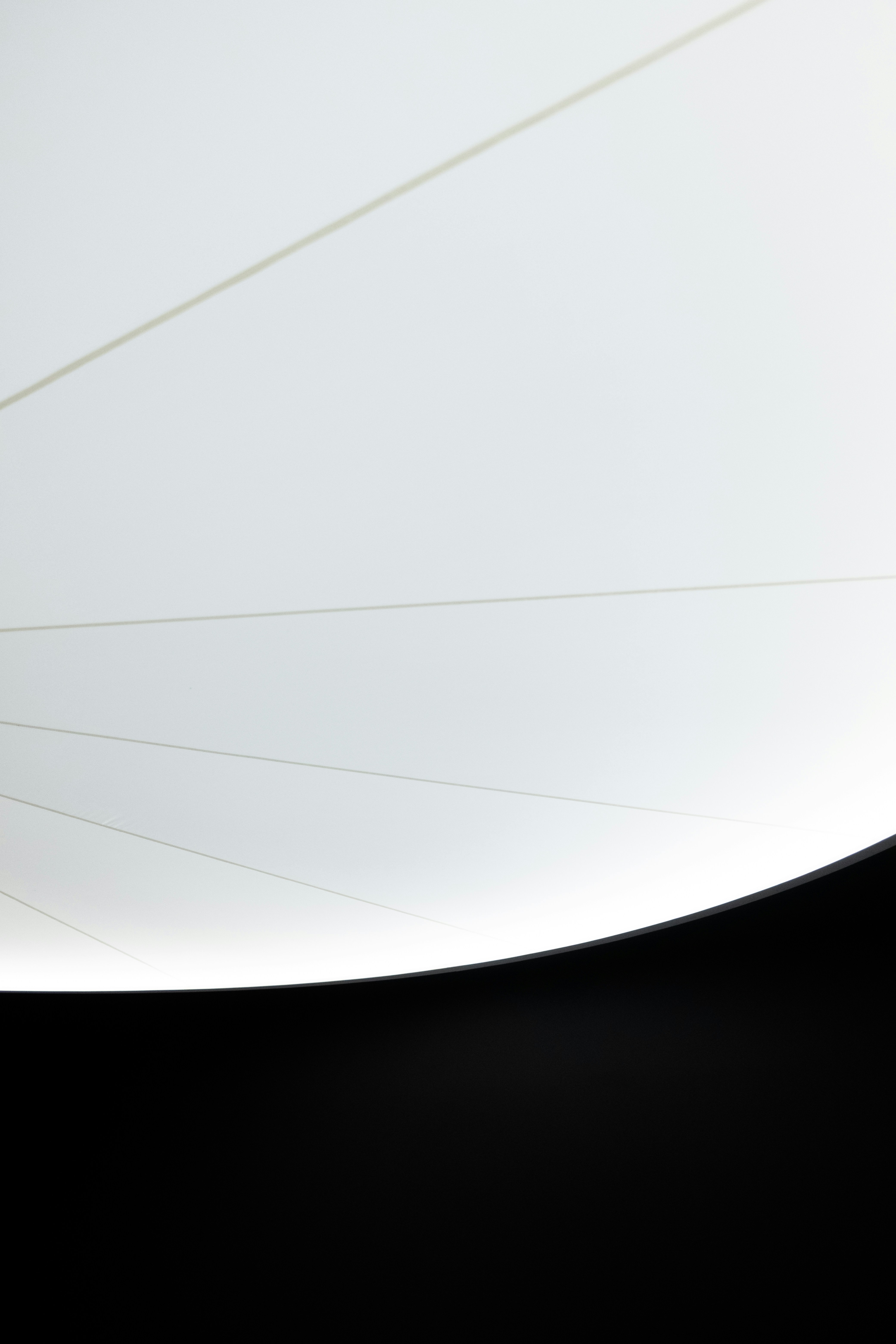 Diagonal Lines Across a Pale Disk: An Abstract Light Study