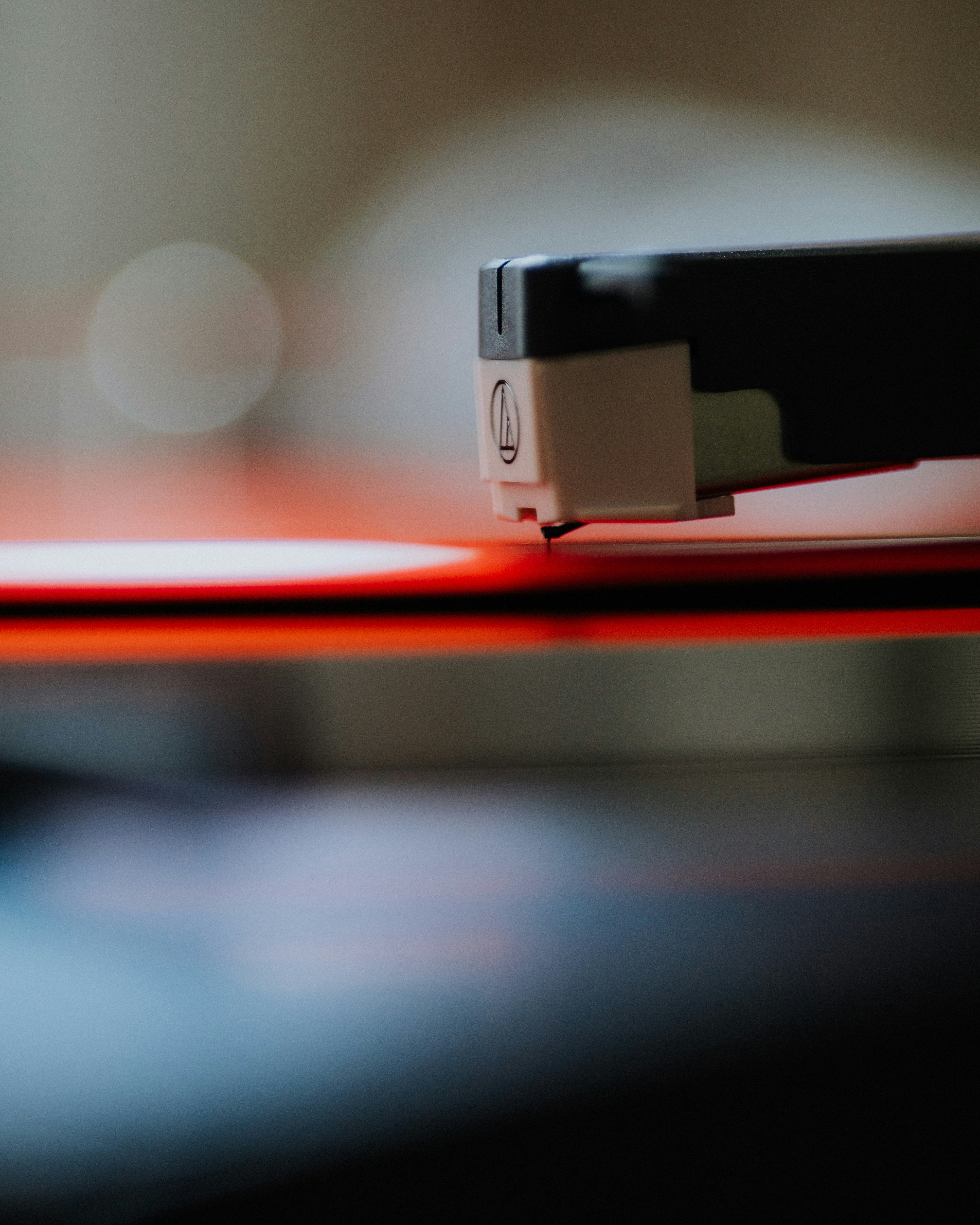 A close up of a cell phone on a table photo – Free Turntable Image on ...