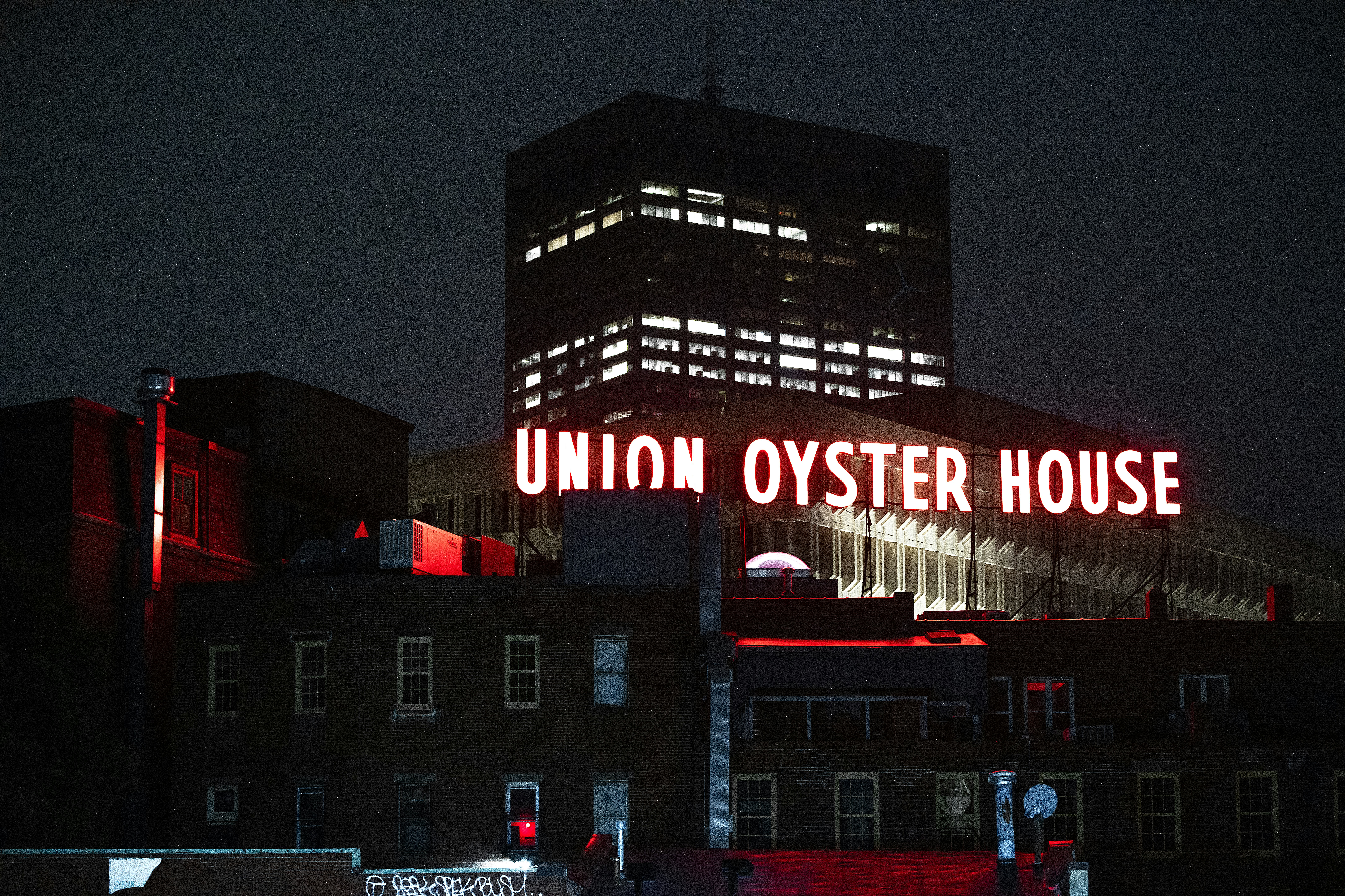 Red Neon Beacon at Union Oyster House: Night Portrait of Brick Facade and Glow