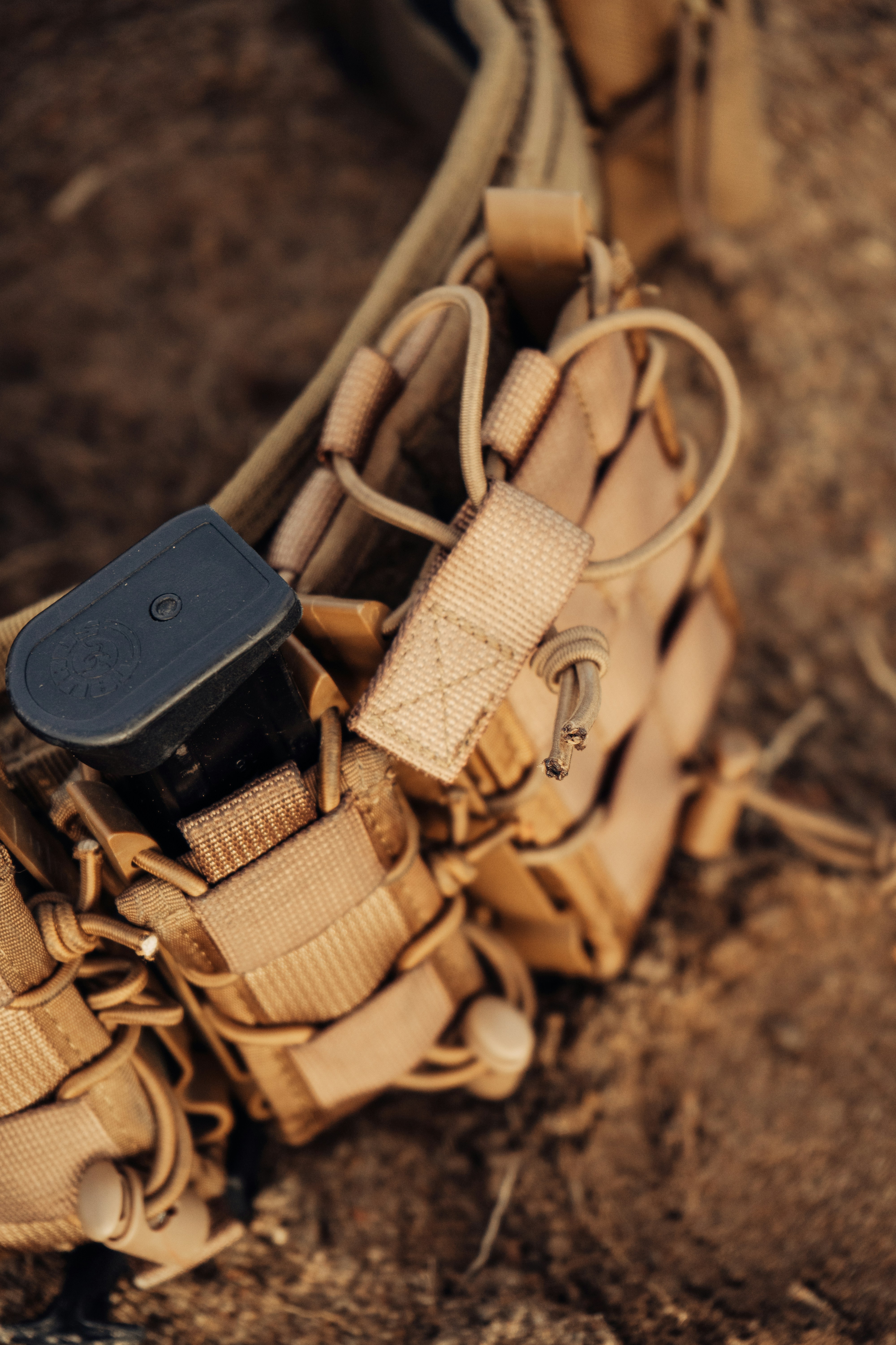 Desert-Tan MOLLE Close-Up: Straps, Buckles, and Tactical Hardware
