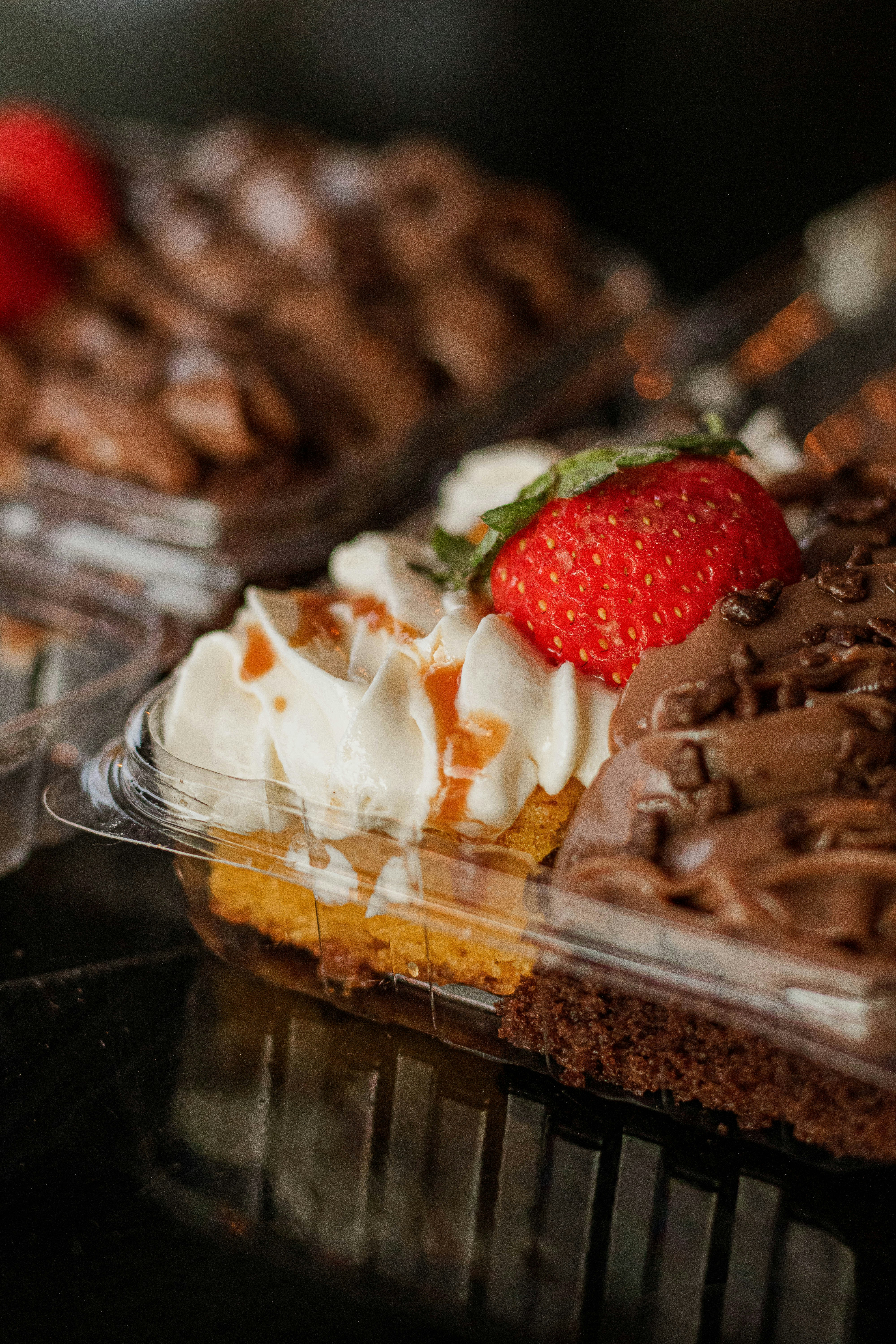 Strawberry Crown on a Cream-Topped Pastry in a Chocolate Ensemble