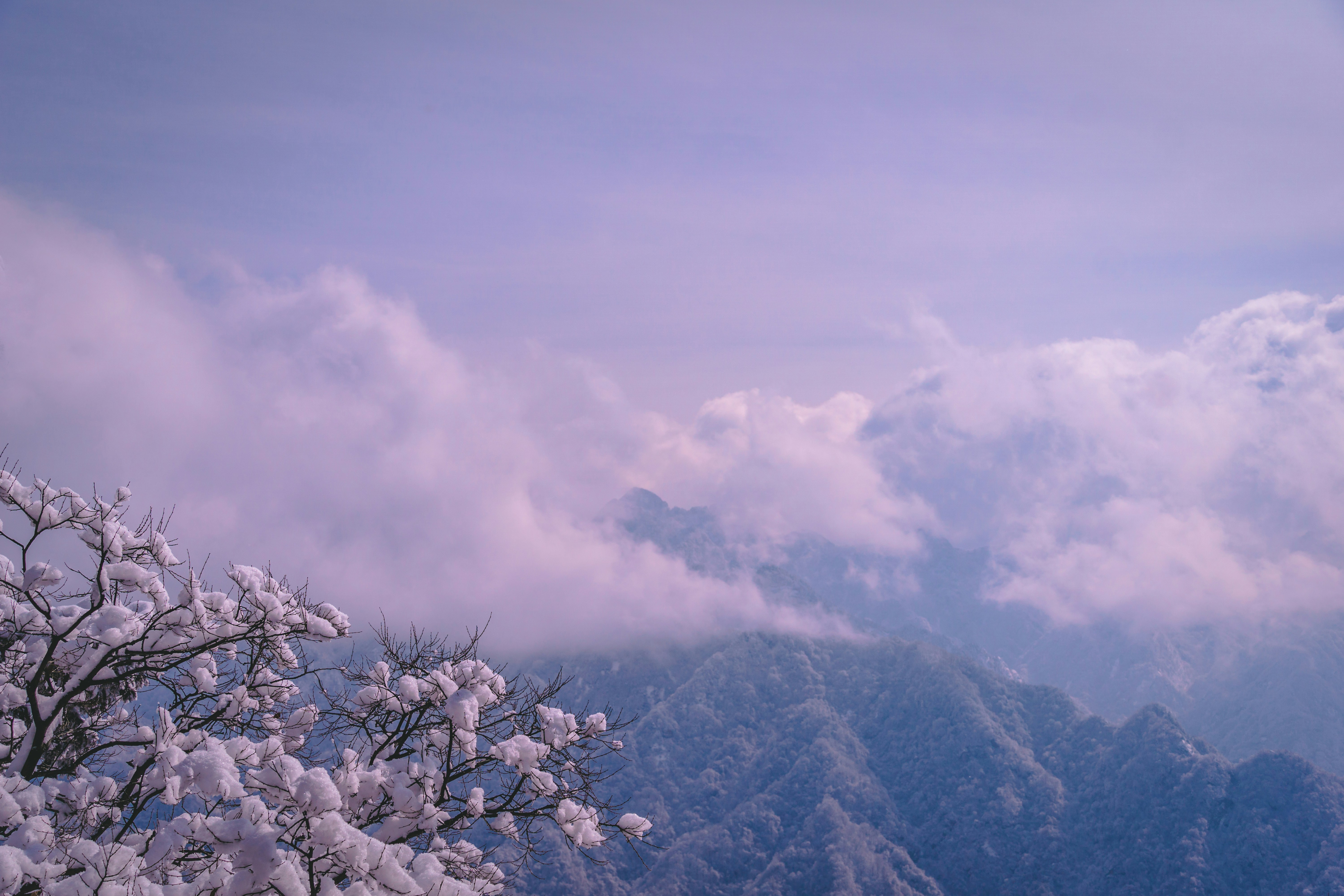 A view of a mountain range covered in snow photo – Free Xian Image on ...