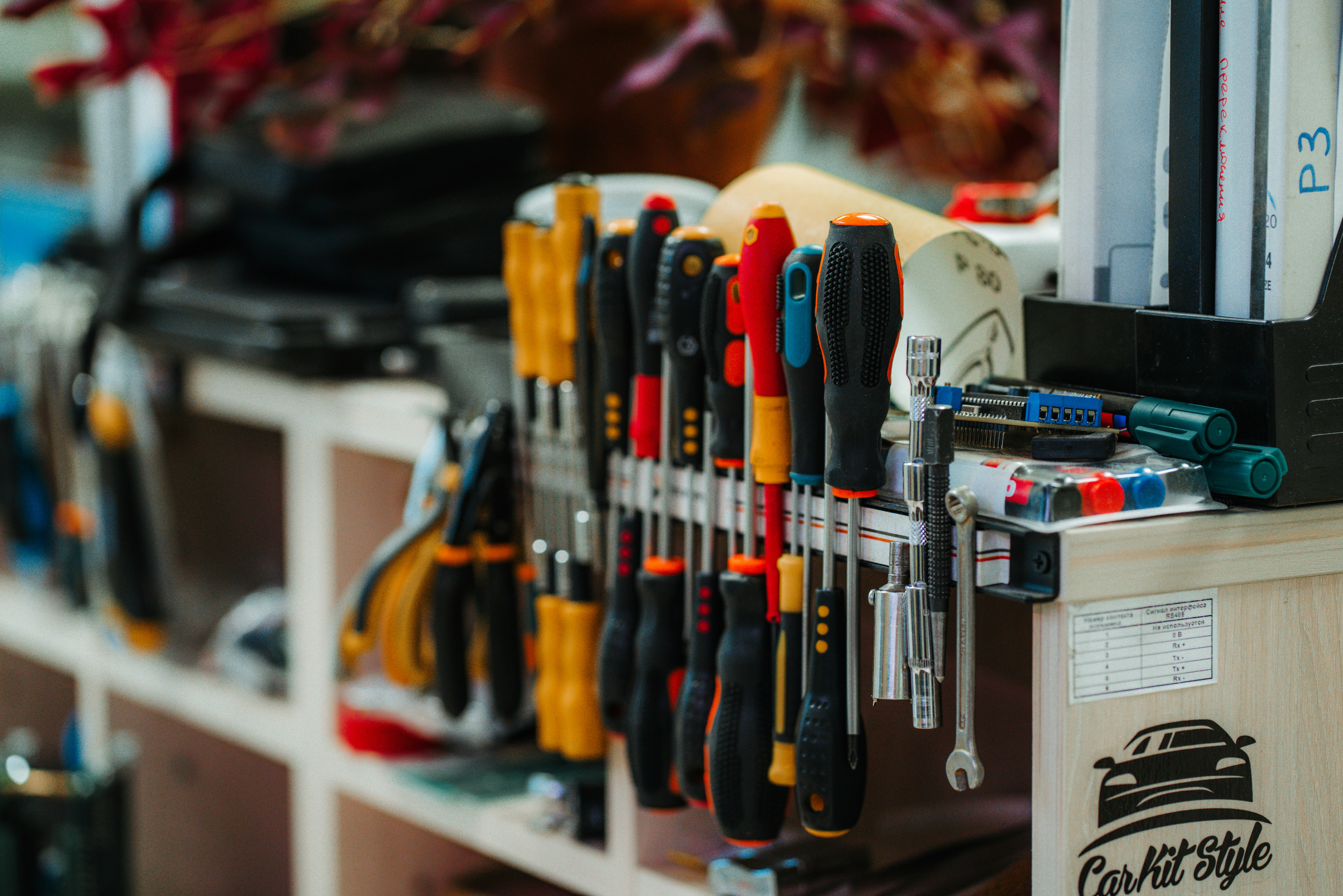 A bunch of tools that are on a shelf photo – Free Office Image on Unsplash