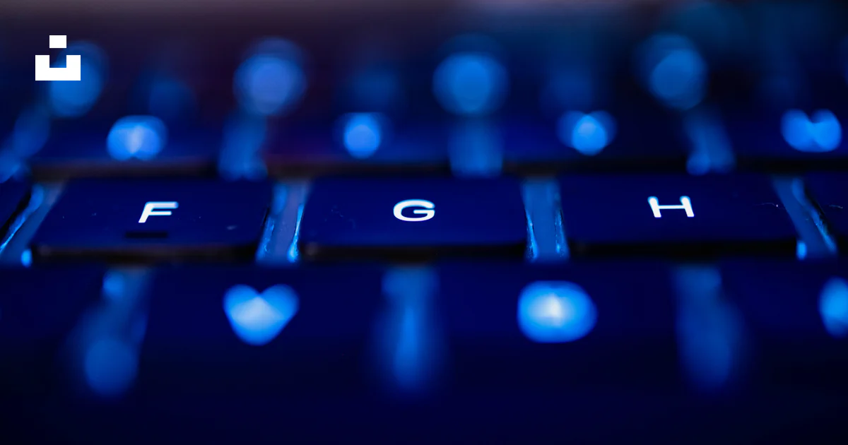 A Close Up View Of A Blue Keyboard Photo Free Laptop Keyboard Image a-close-up-view-of-a-blue-keyboard-photo-free-laptop-keyboard-image