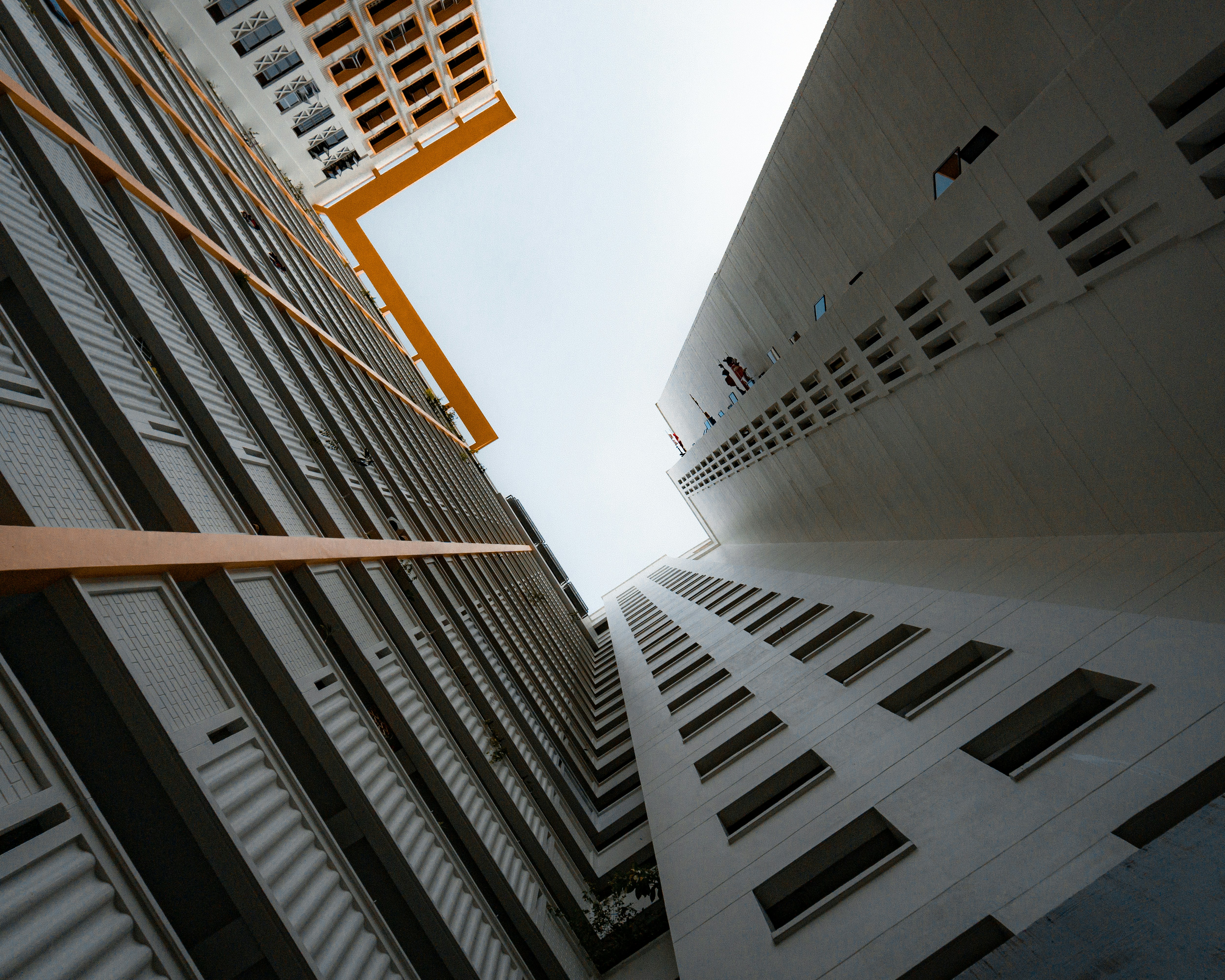 Looking up at a tall building from the ground photo – Free Photography ...