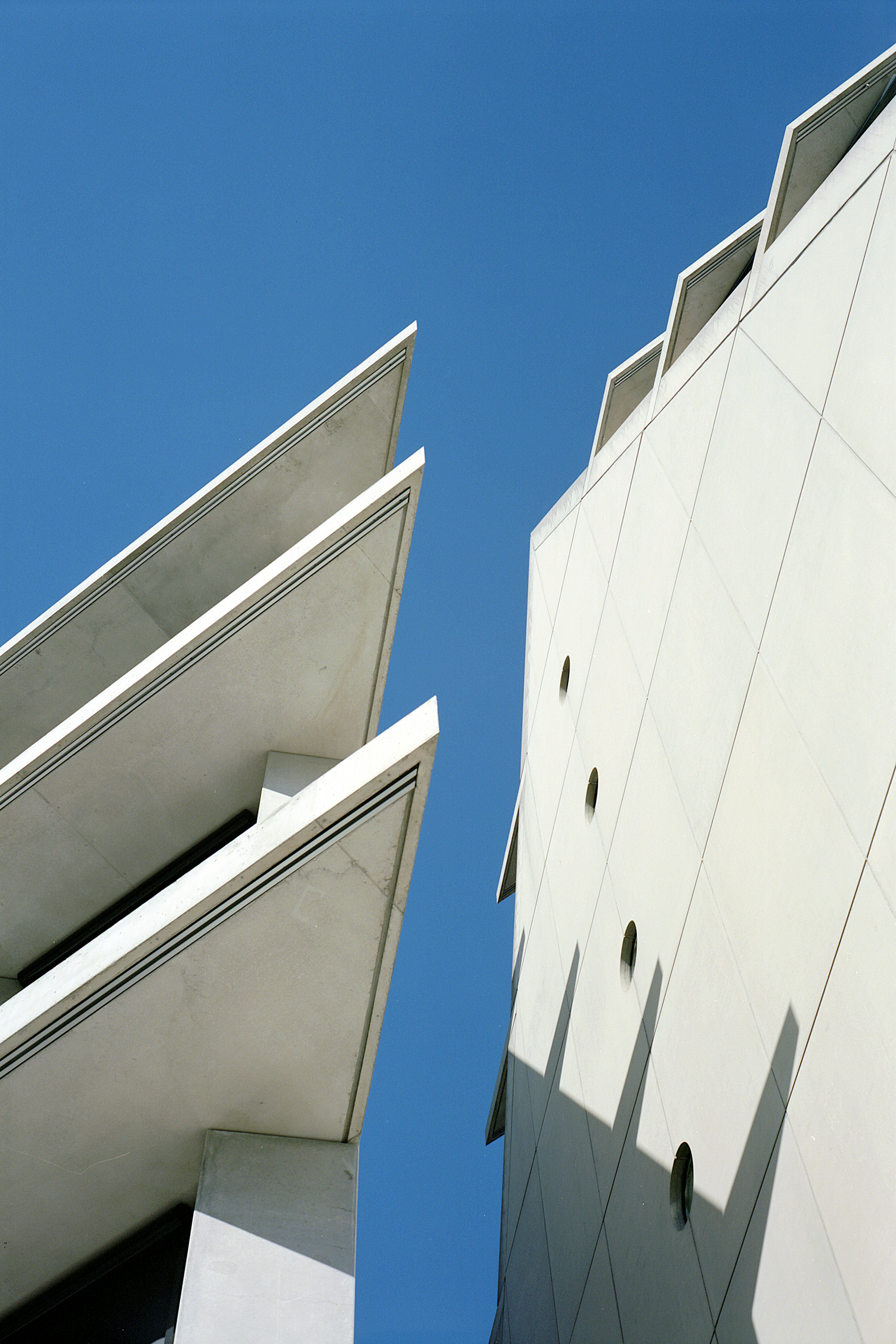 A close up of a building with a sky background photo – Free Street ...