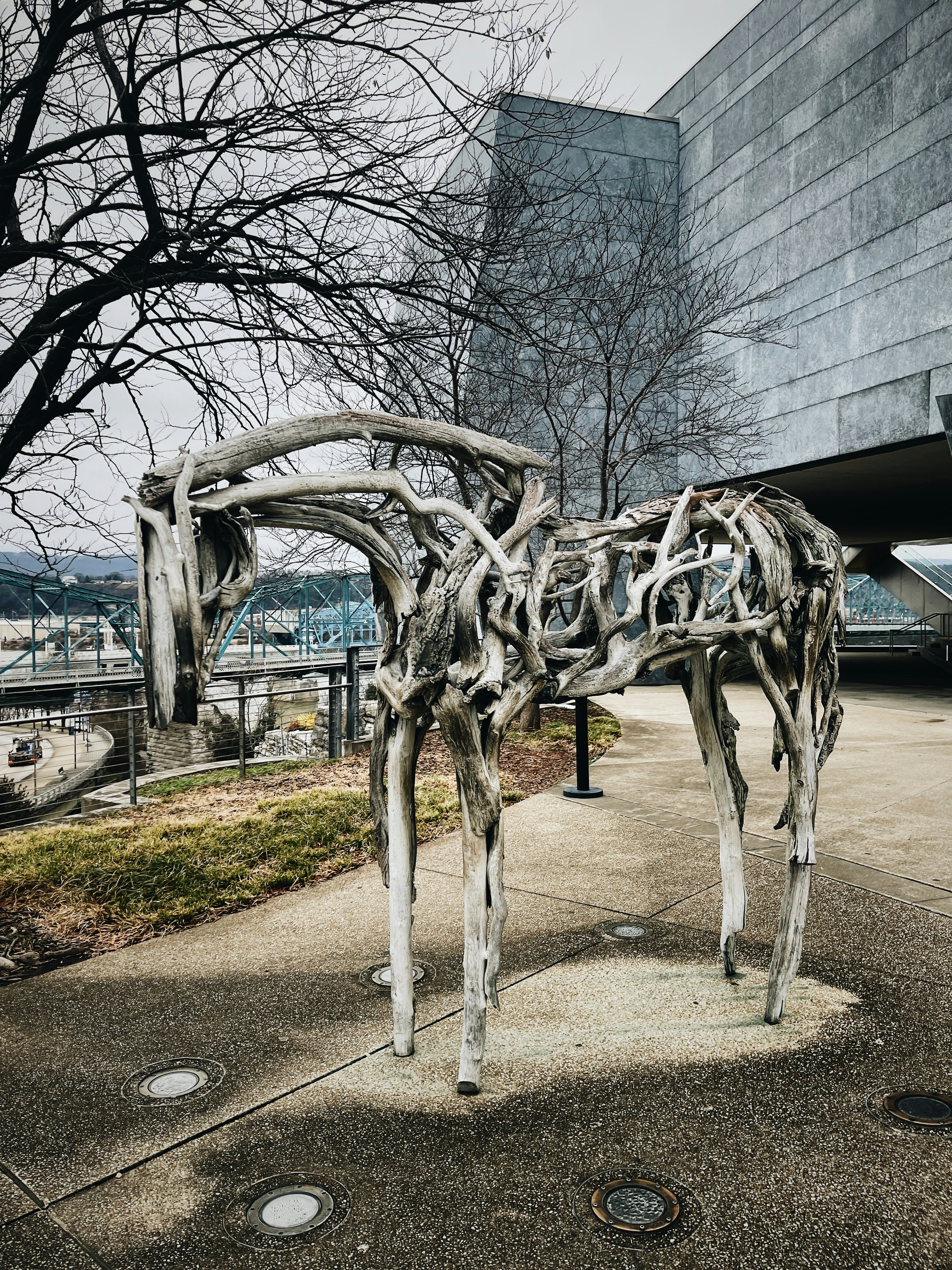 a sculpture of a horse made out of branches