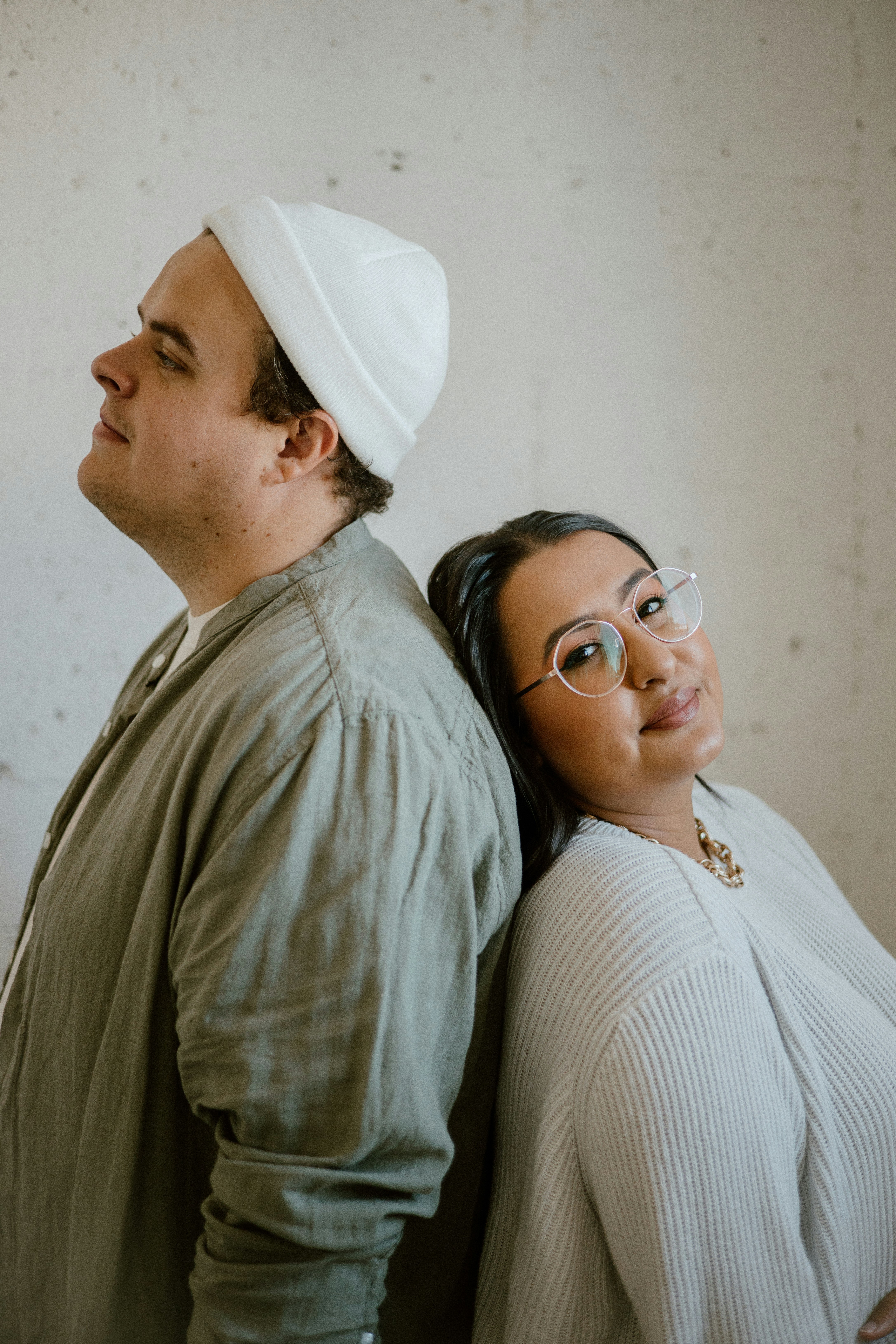 United in Shadow and Light: Back-to-Back Portrait in Soft Studio Tone