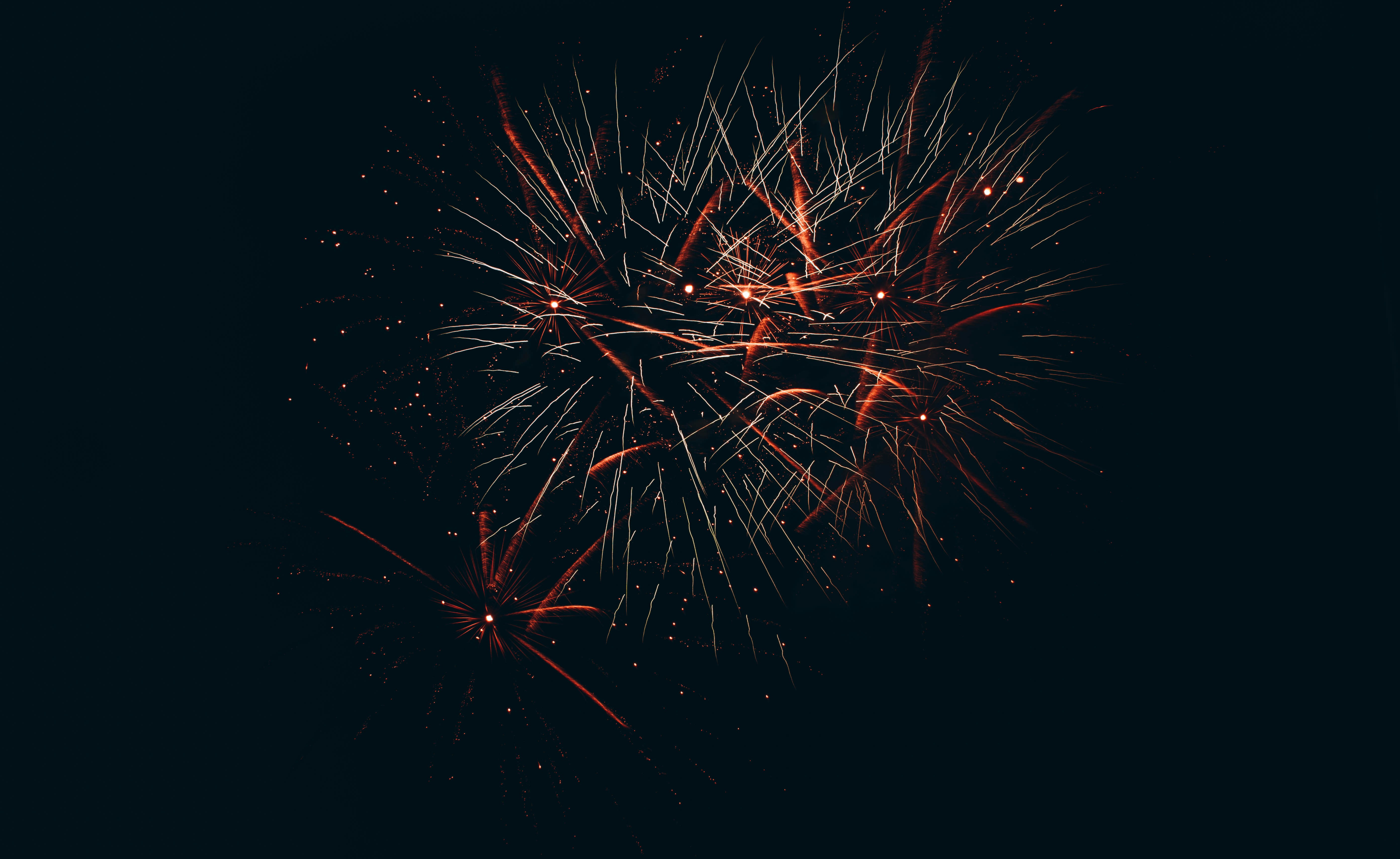 A bunch of fireworks are lit up in the night sky photo – Free Fireworks ...