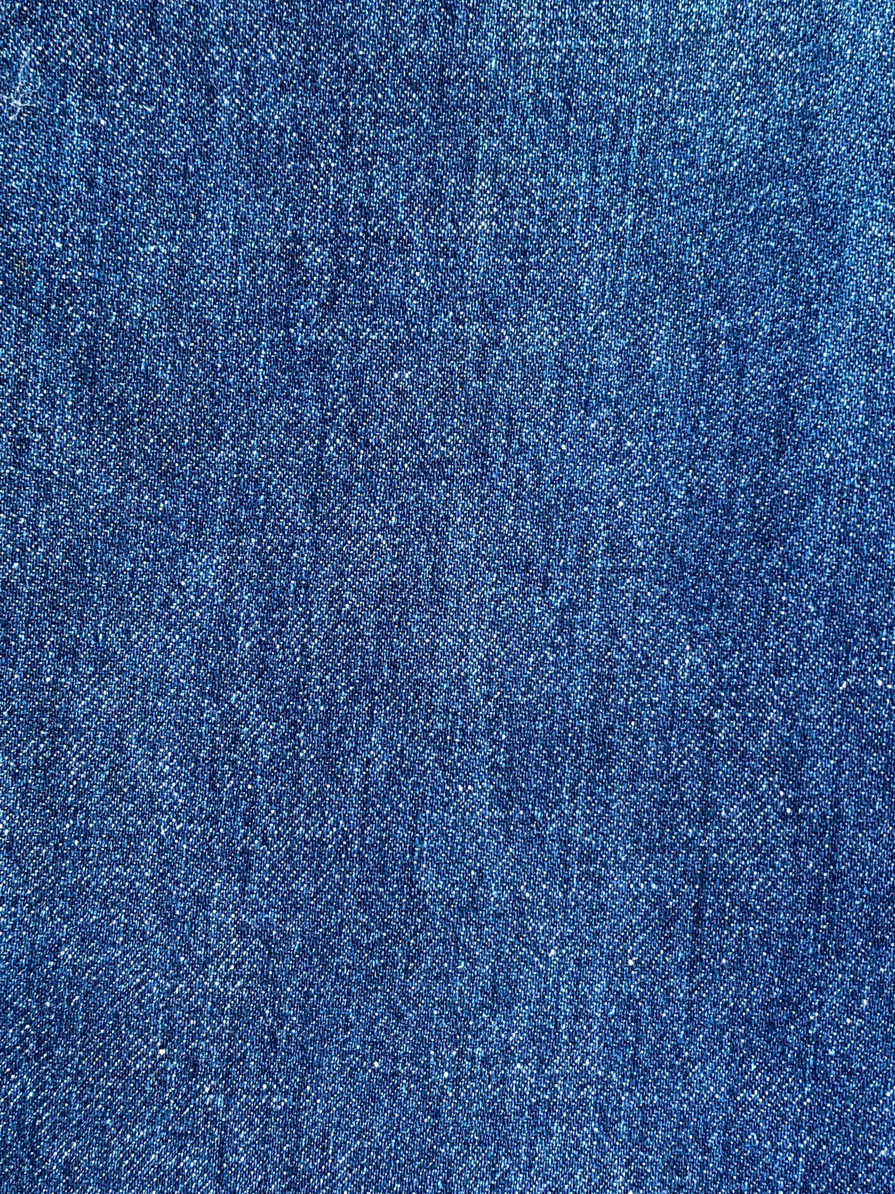 A close up of a blue jean fabric photo – Free Denim Image on Unsplash