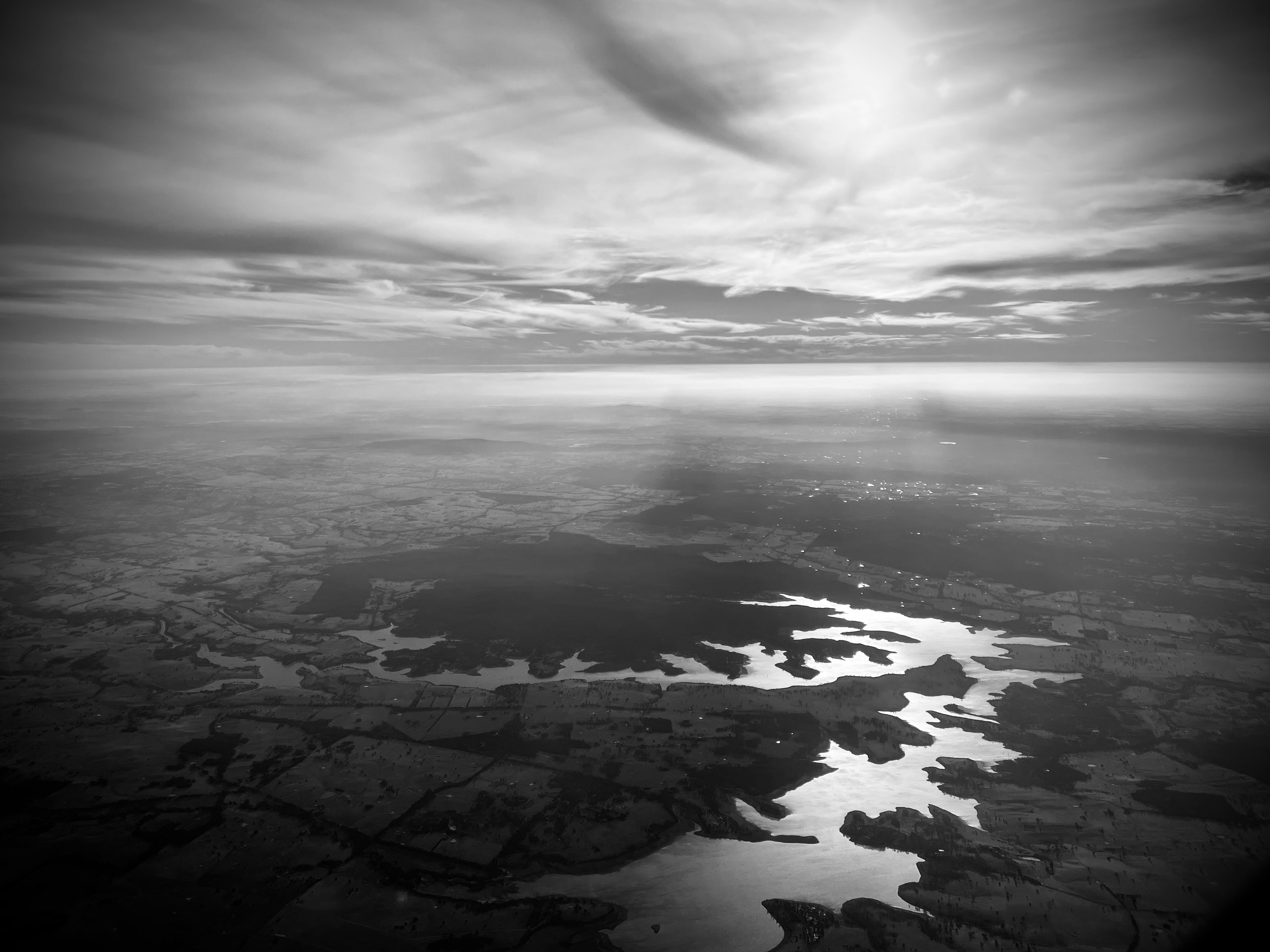 Monochrome Meanders: An Aerial Portrait of Rivers and Horizon
