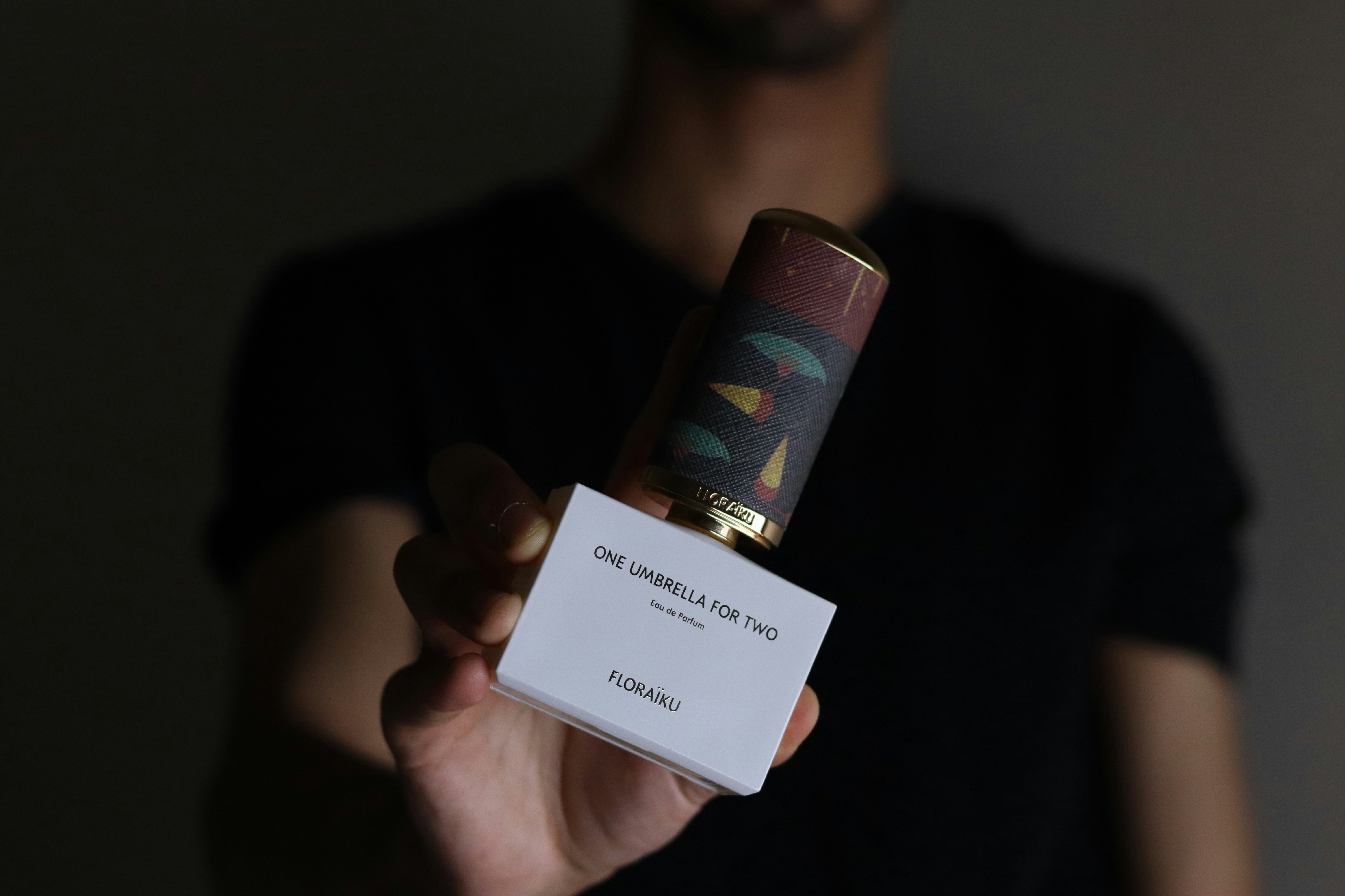 A man holding a small bottle of wine photo – Free Paris Image on Unsplash