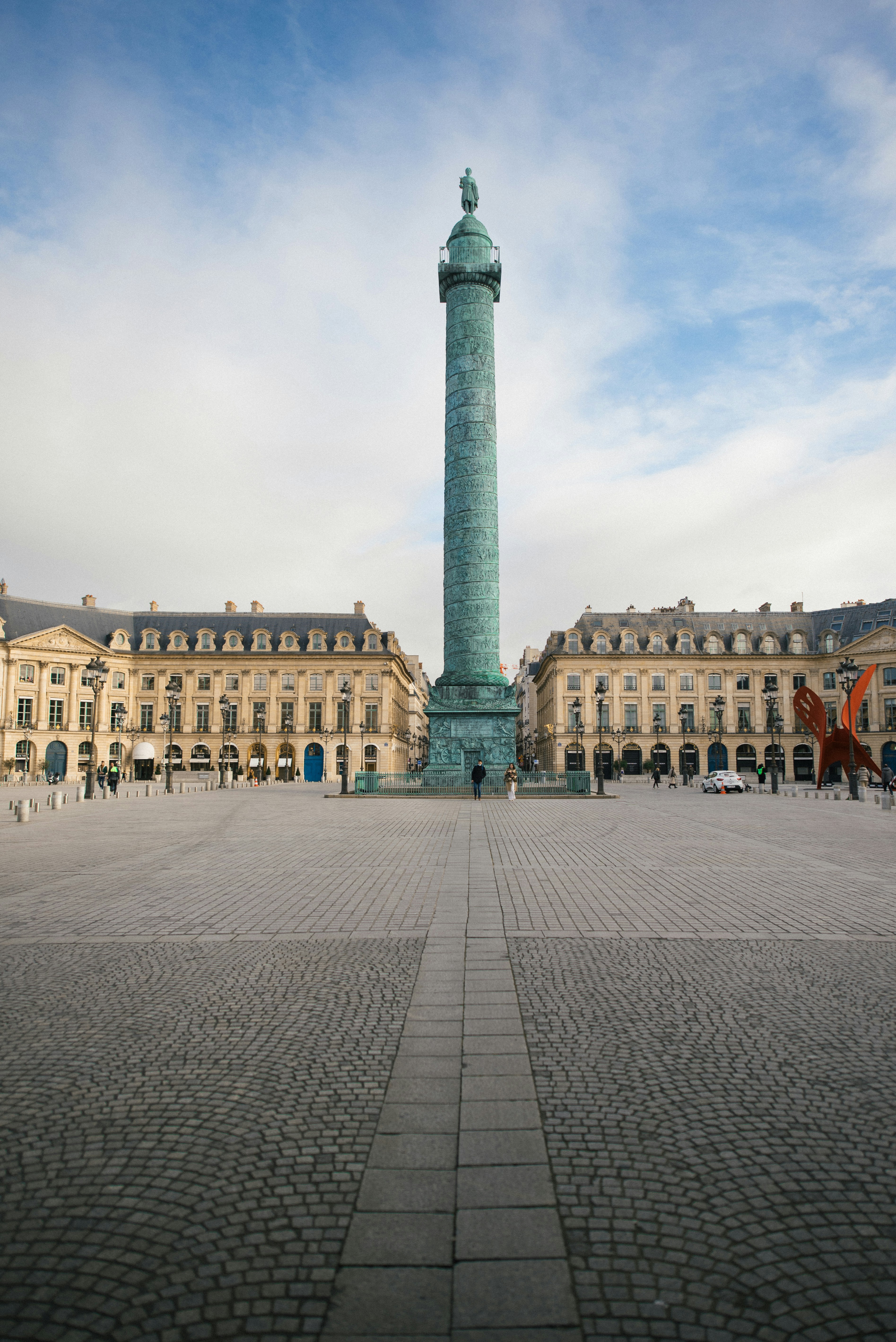 Verdigris Monument at the Heart of a Symmetrical European Square